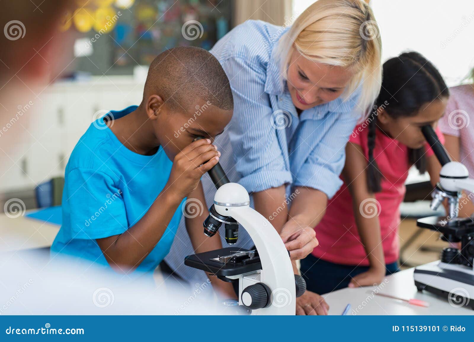Children Scholar Looking through Microscope Stock Image - Image of ...