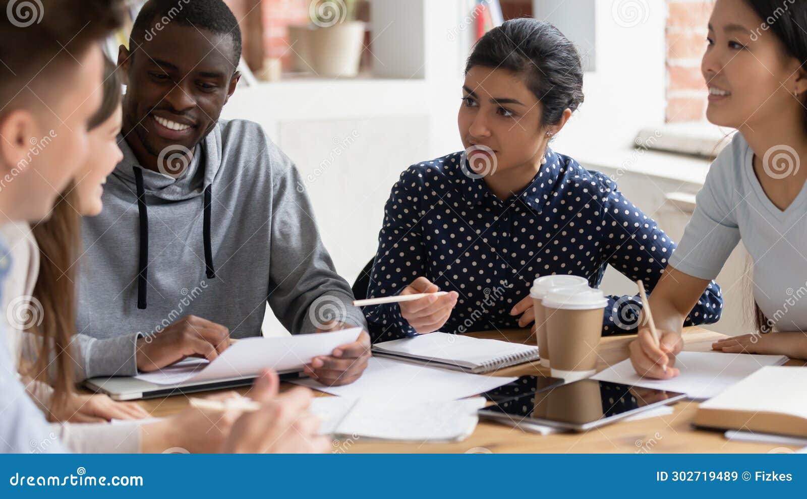 Multiethnic Students Talk Discussing Project in Classroom Together ...