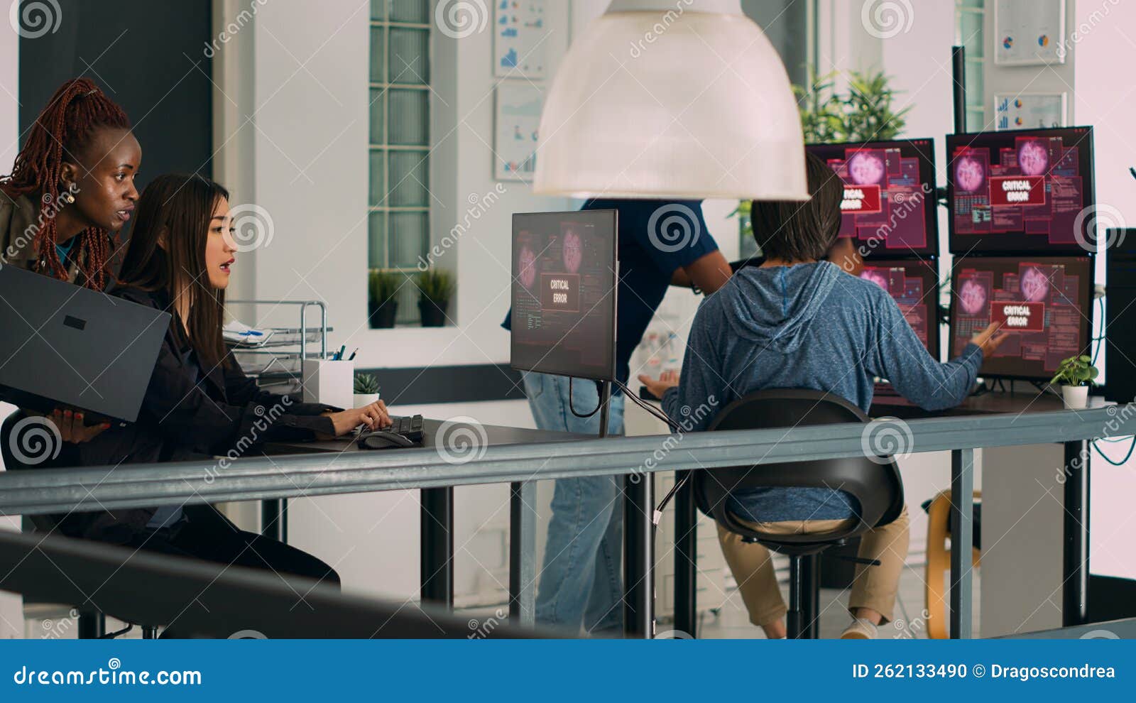 Multiethnic Team Of Coders Encountering System Error Message On
