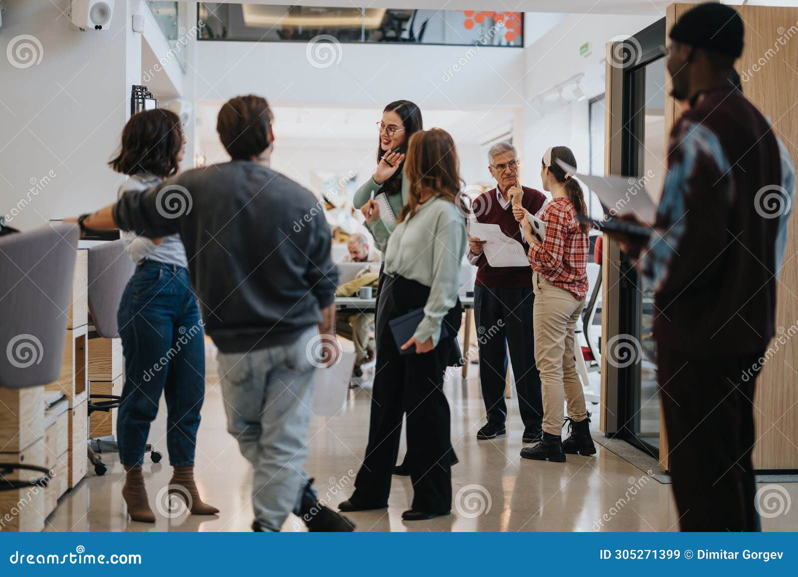 Engaged Colleagues in Casual Business Meeting at Modern Office Space ...