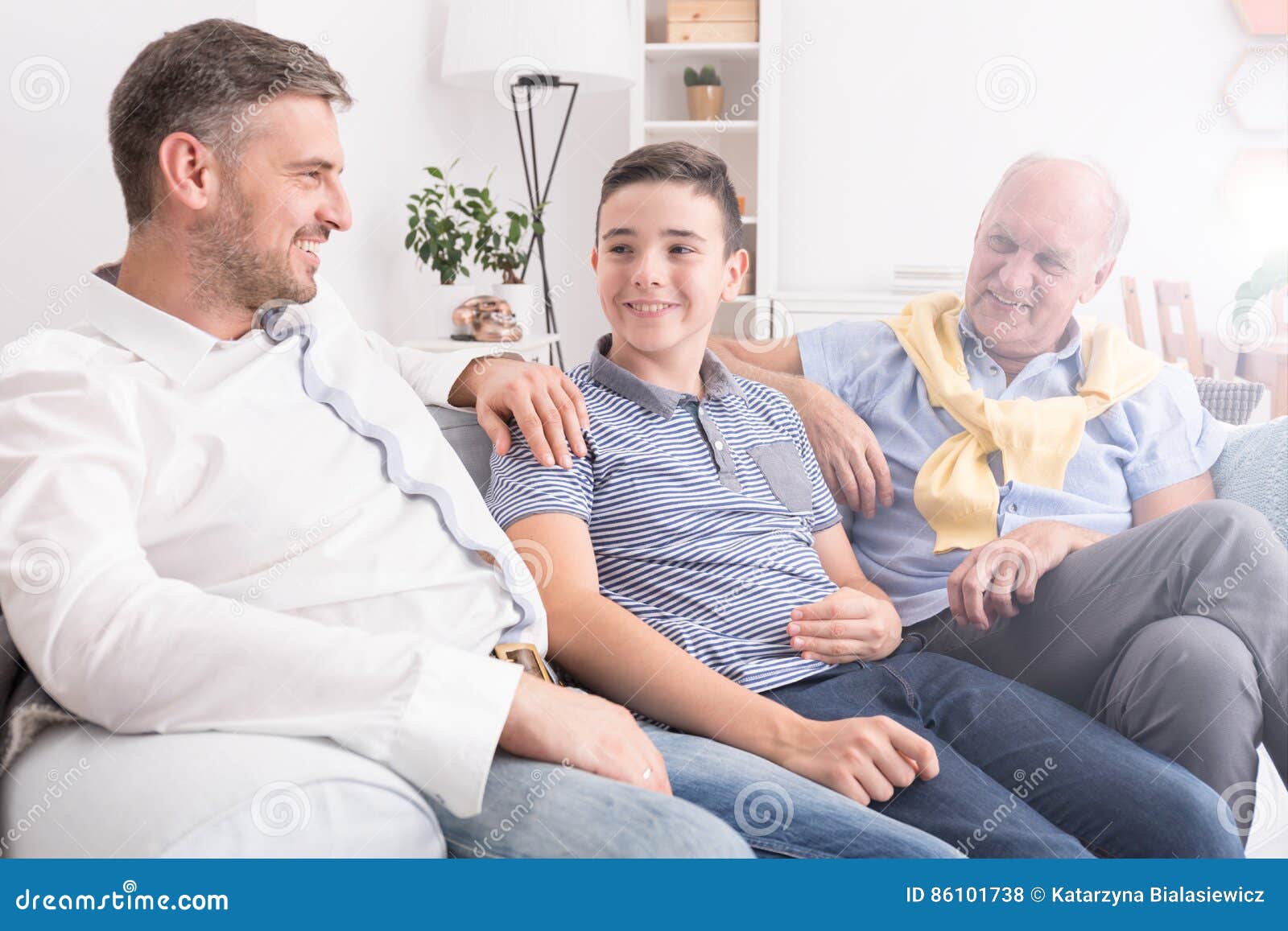 Multigenerational Family on a Sofa Stock Photo - Image of generations ...