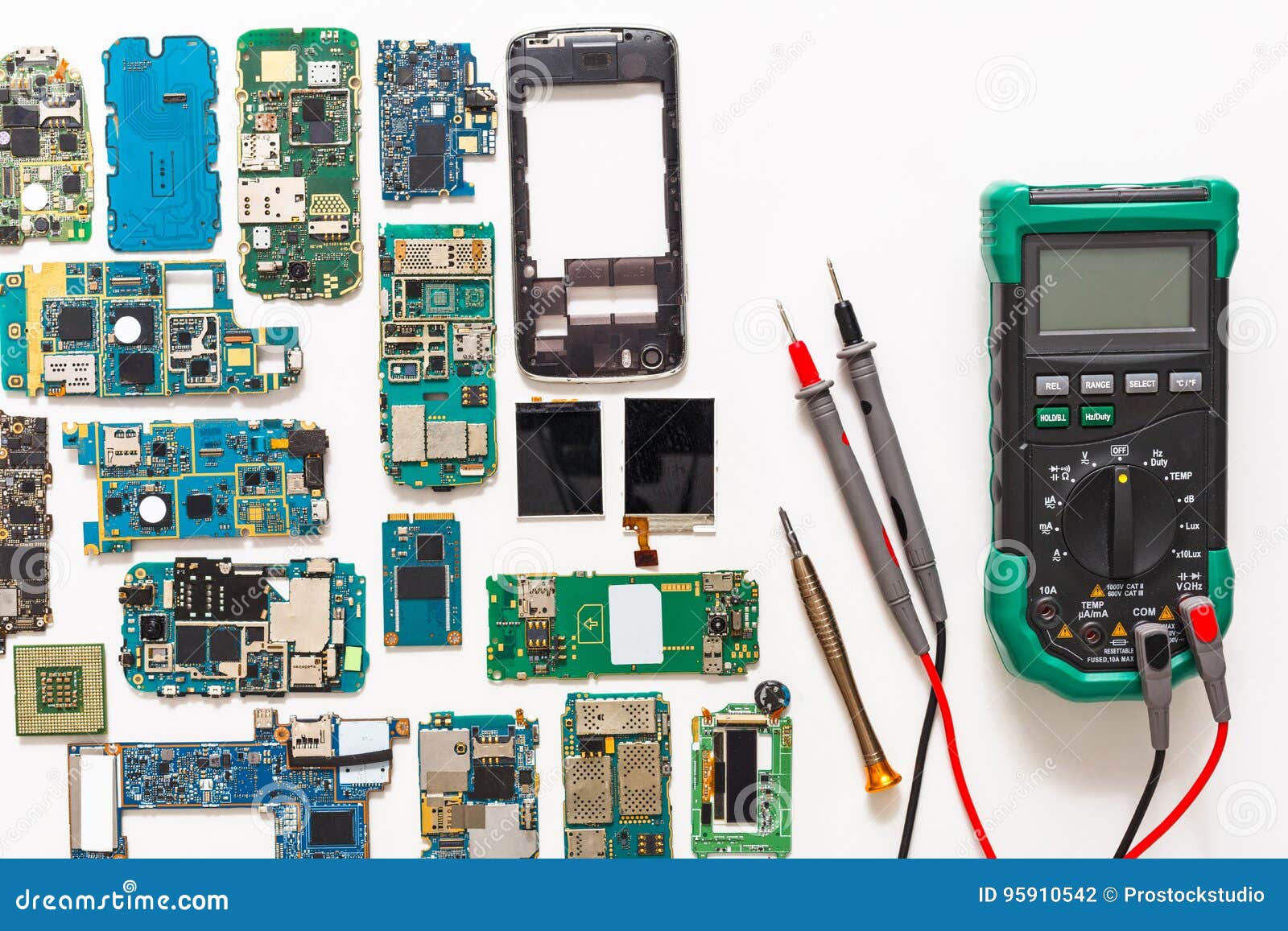 Multimeter and Broken Mobile Electronics at Repair Shop Stock Photo ...