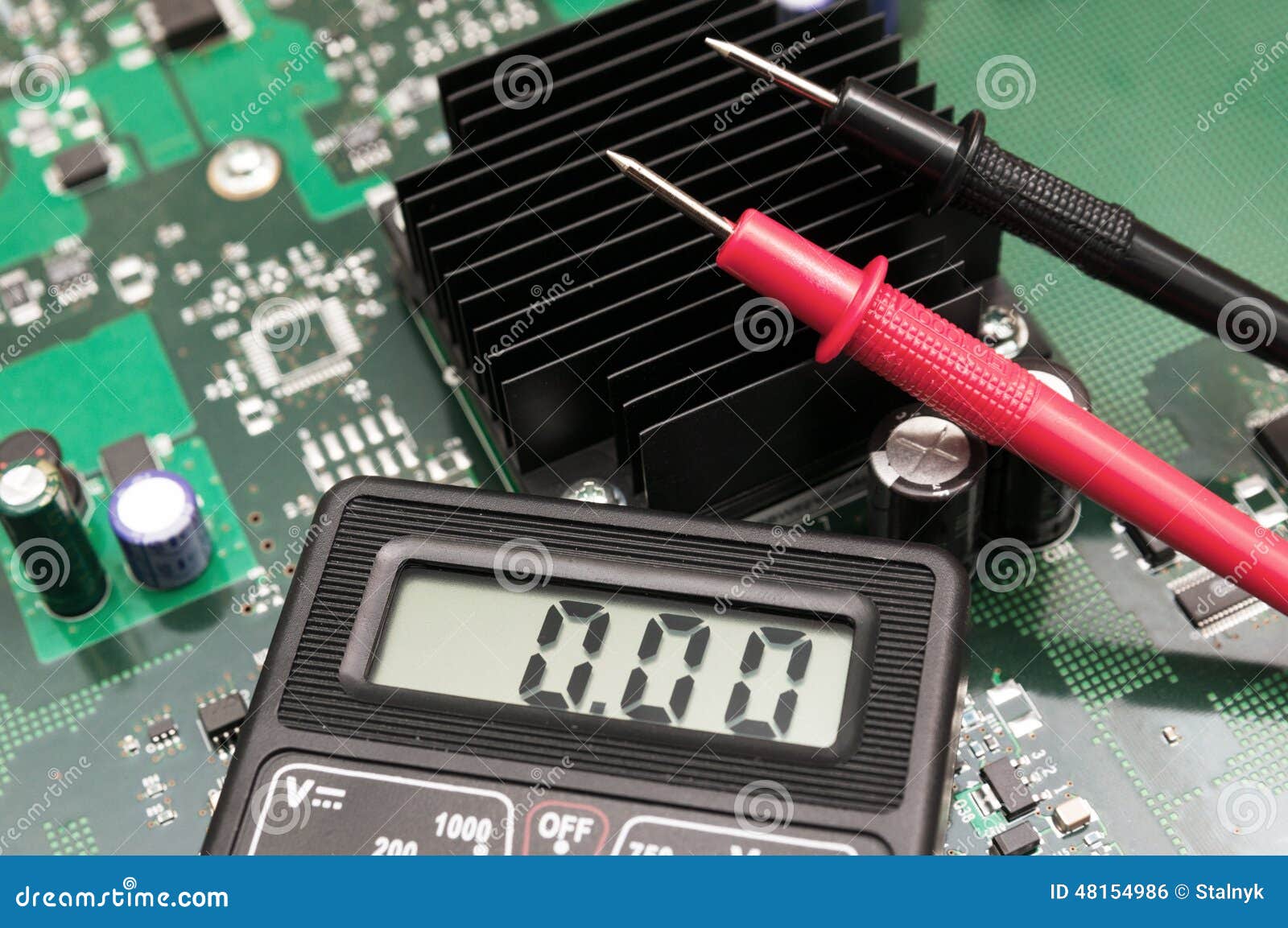 Multimeter on PCB plate. stock photo. Image of equipment - 48154986