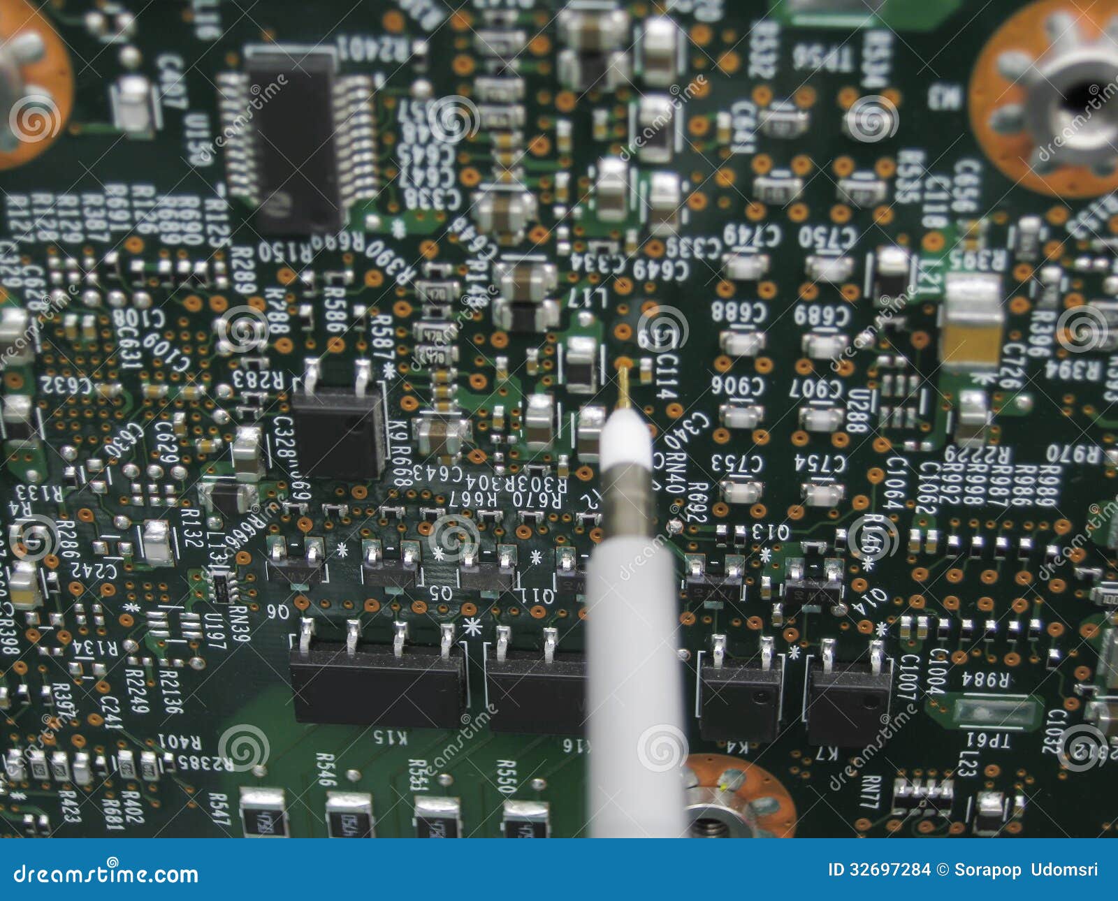 Multimeter Probes Examining a Circuit Board Stock Photo - Image of ...