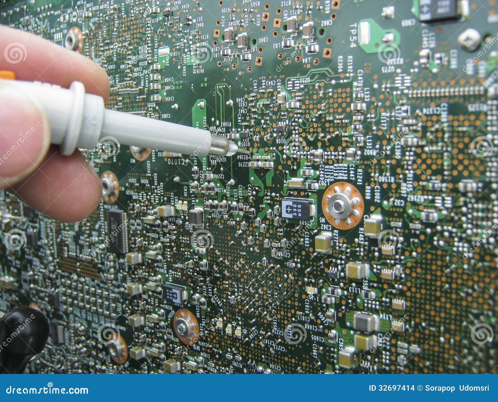 Multimeter Probes Examining a Circuit Board Stock Photo - Image of ...