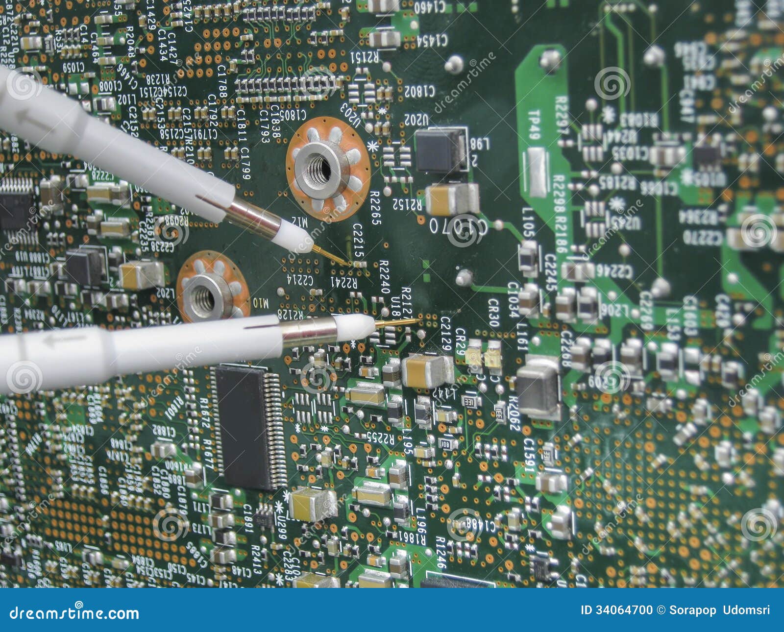 Multimeter Probes Examining a Circuit Board Stock Photo - Image of ...