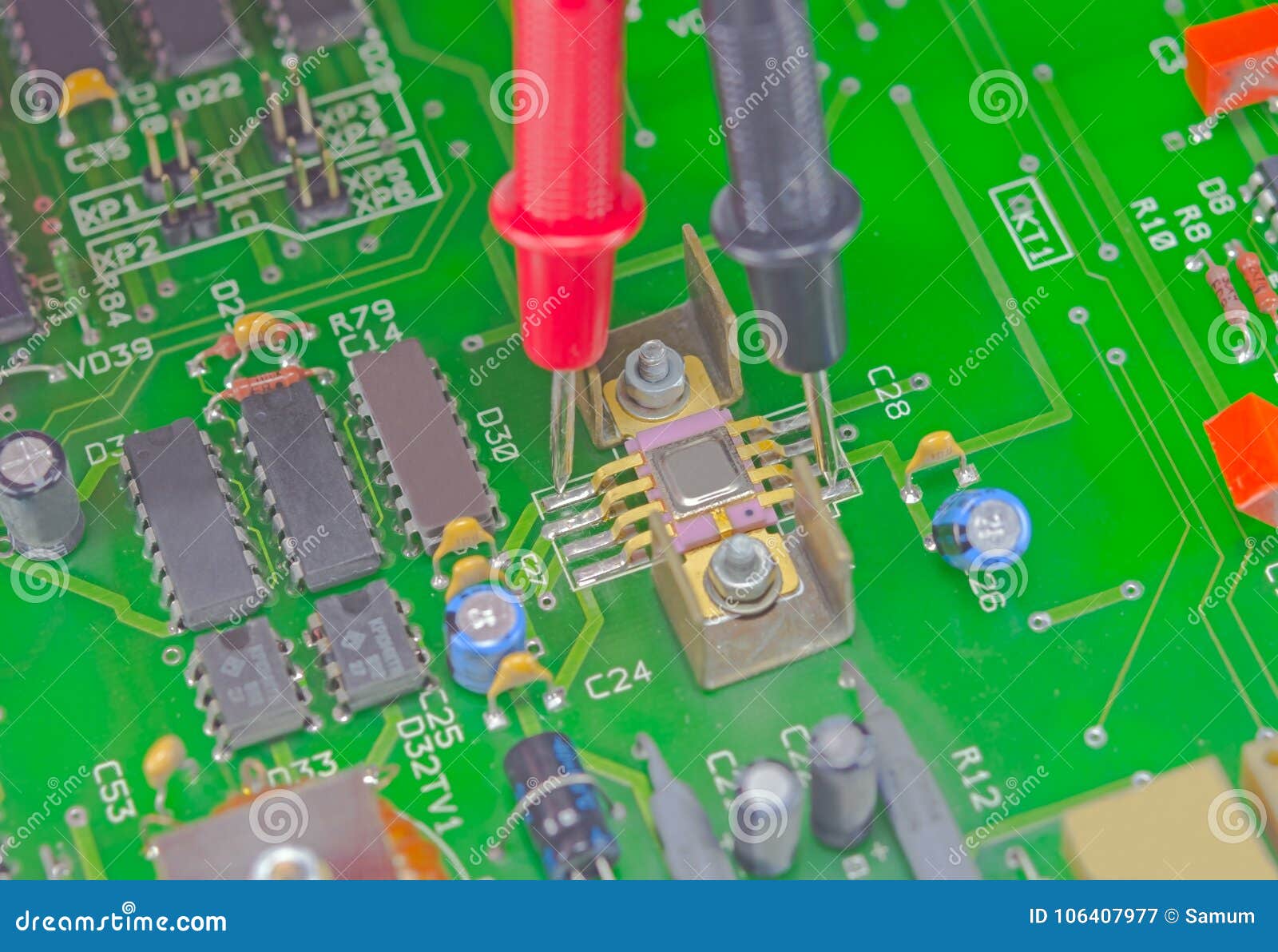 Multimeter Probes Examining a Computer Circuit Board Stock Image ...