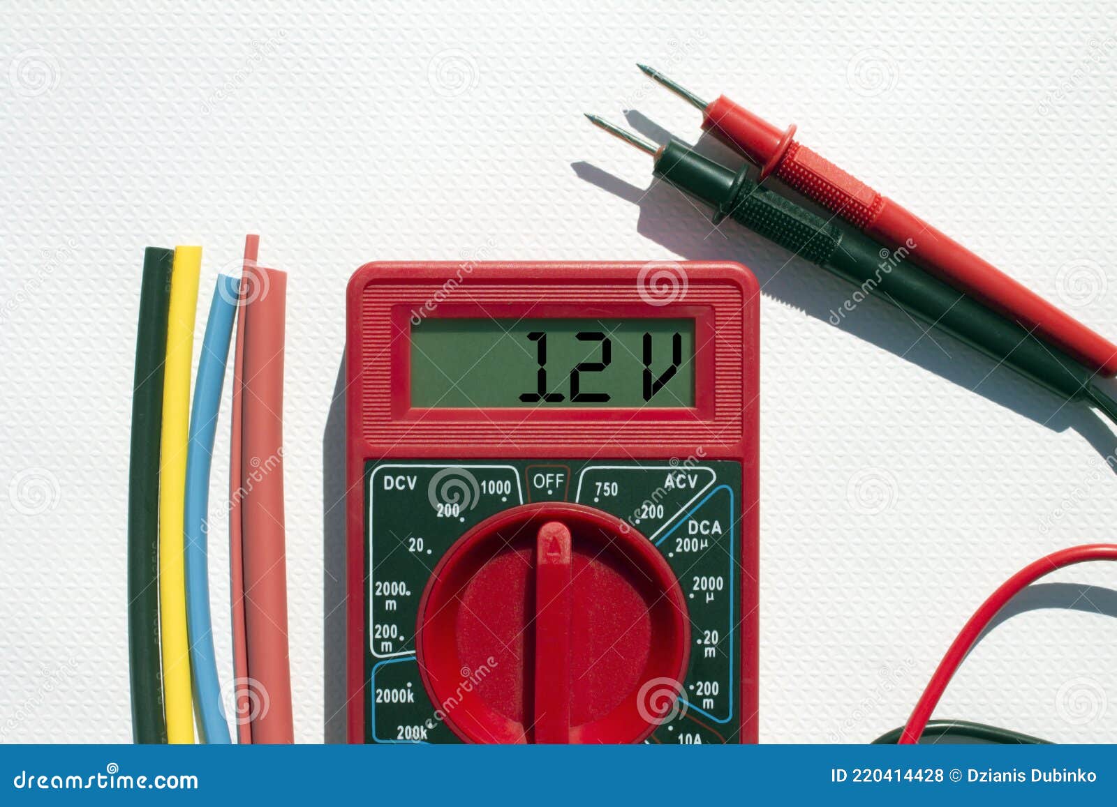 Multimeter with Text on Display 12 V and Heat Shrink Insulation on ...