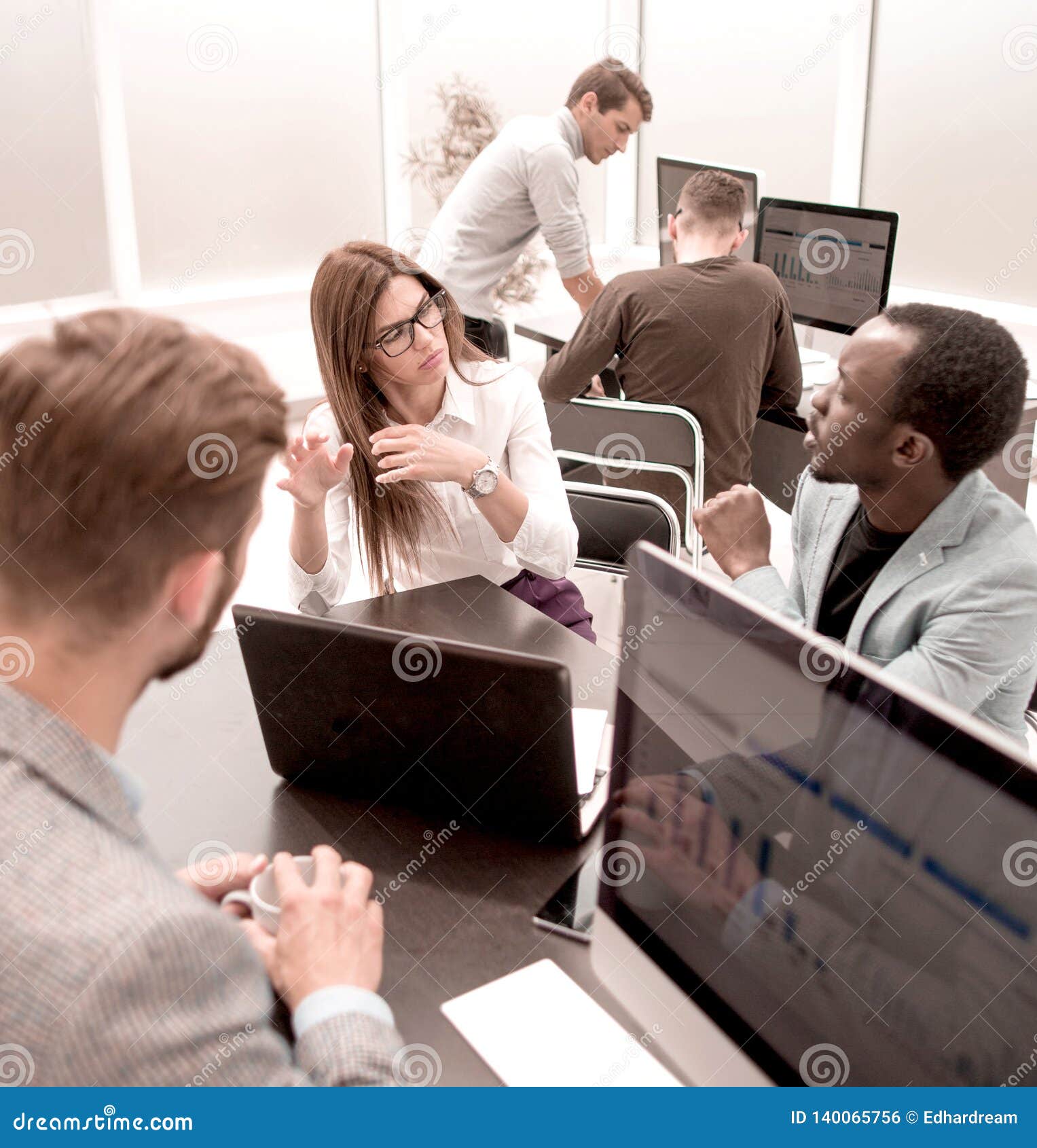 Multinational Business Team in the Workplace in the Office Stock Photo ...