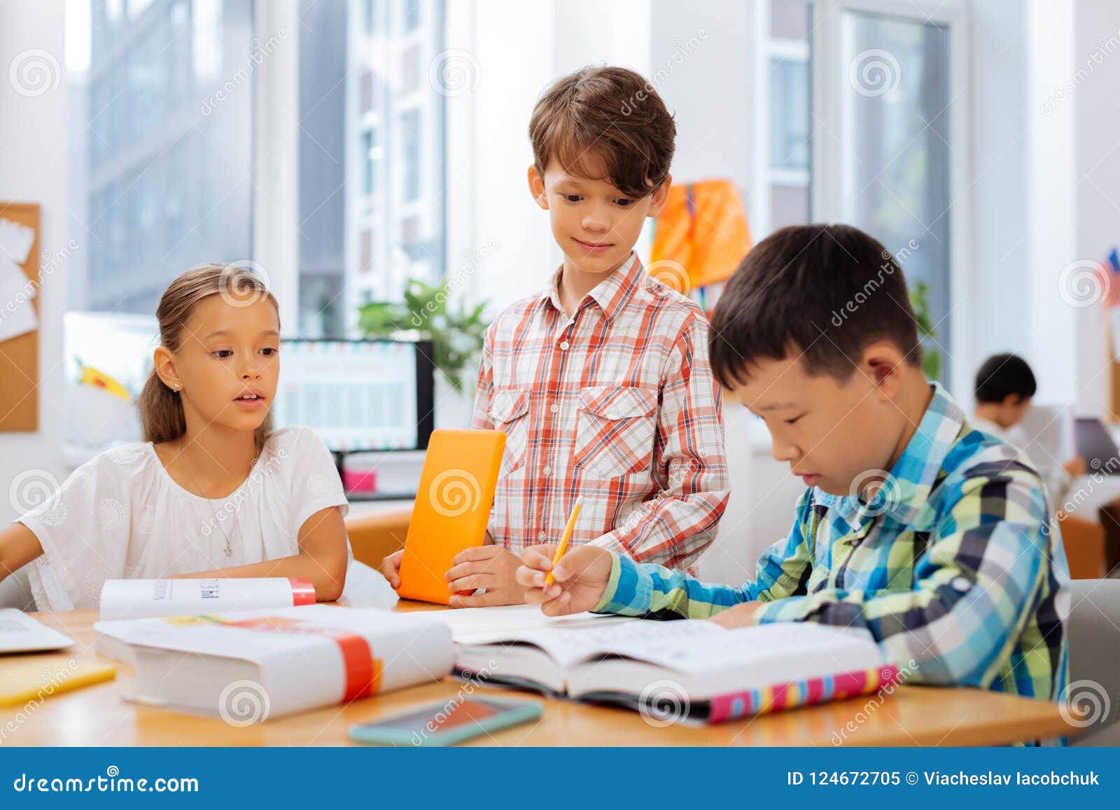 Multinational Classmates Studying Together in a Classroom Stock Image ...