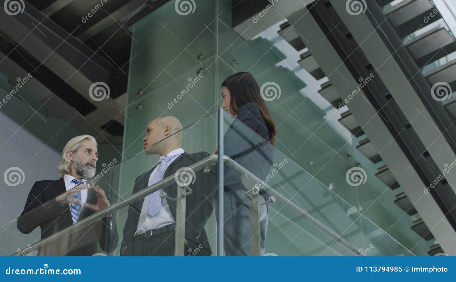 Multinational Corporate Executives Discussing Business in Modern Stock ...