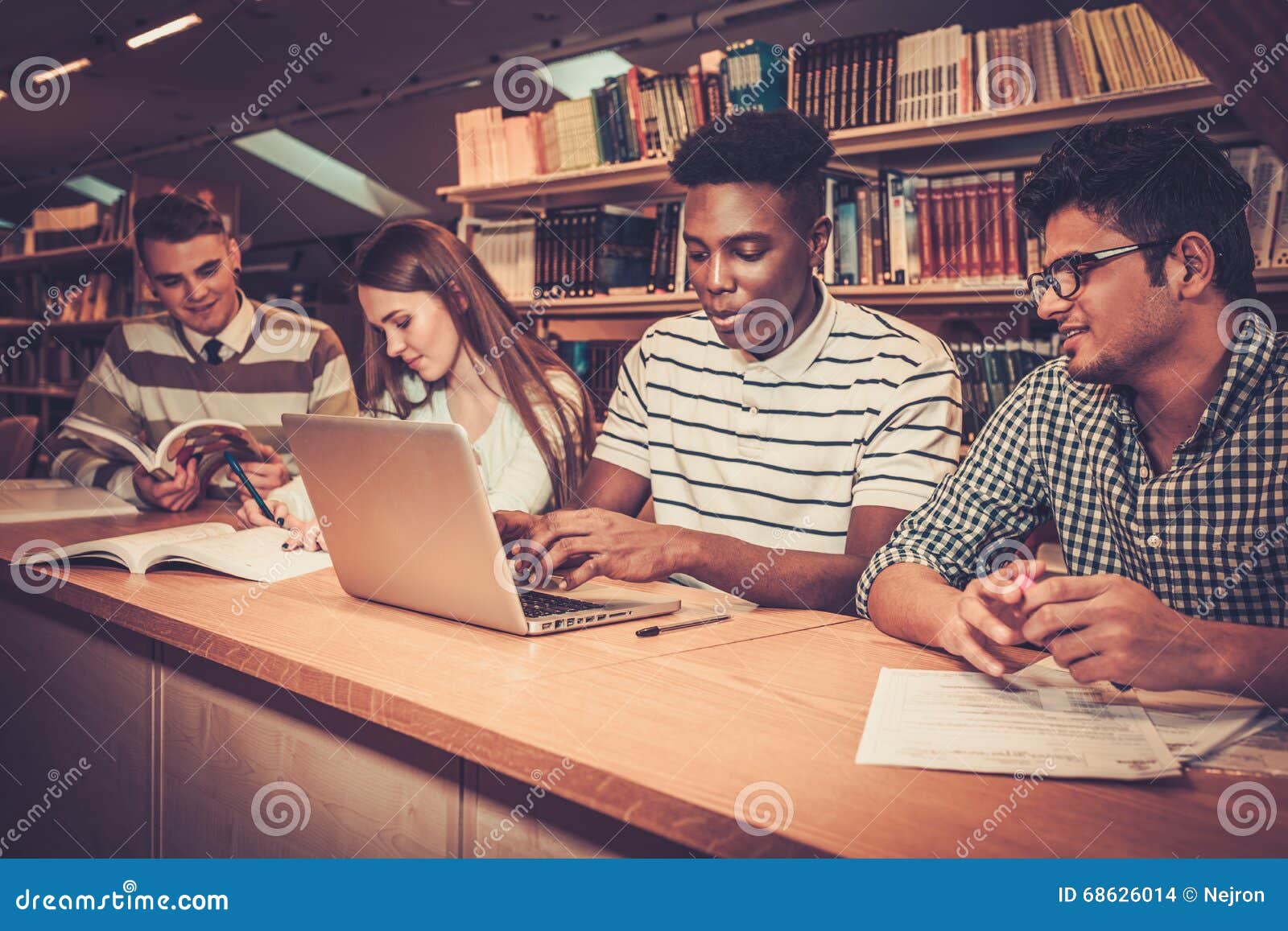 Multinational Group of Cheerful Students Studying in the University ...