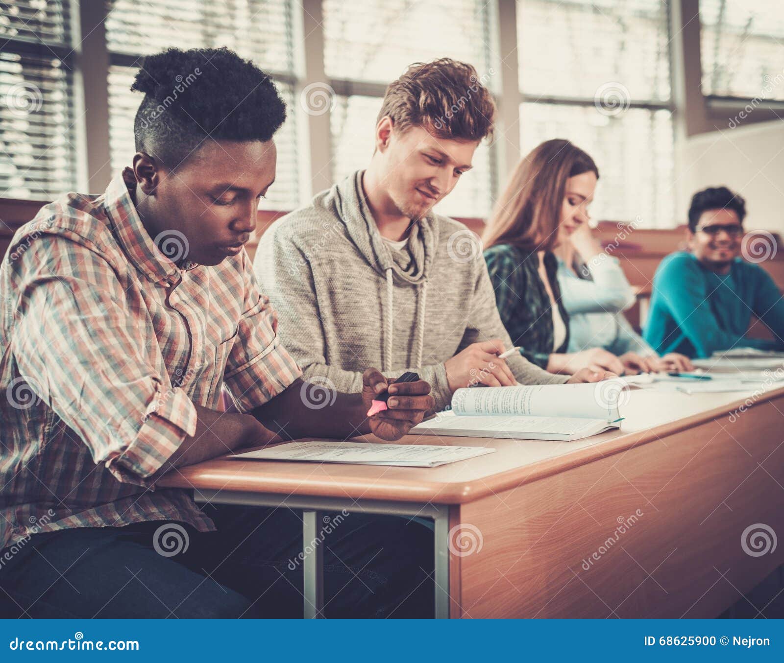 Multinational Group of Cheerful Students Taking an Active Part in a ...