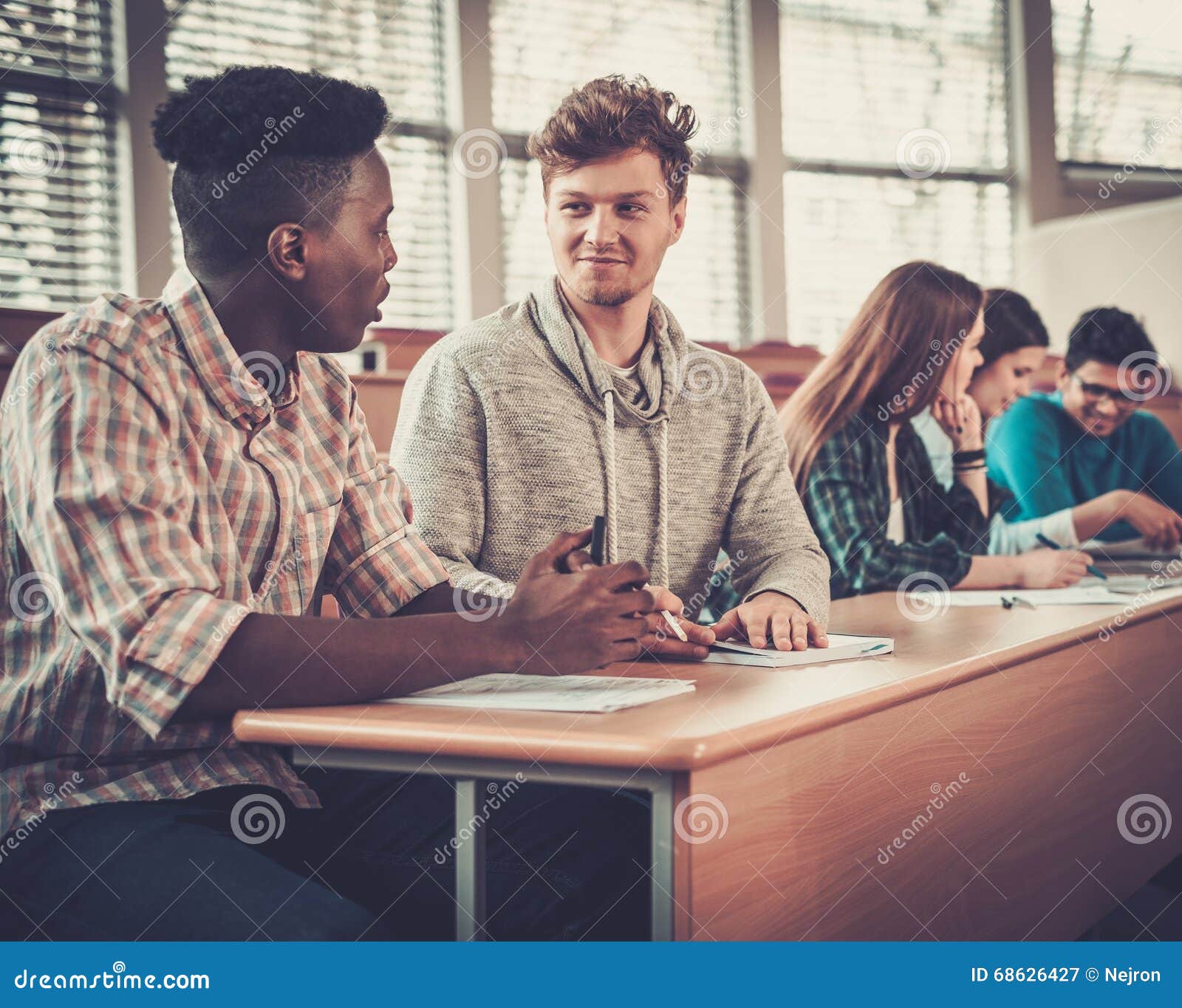 Multinational Group of Cheerful Students Taking an Active Part in a ...