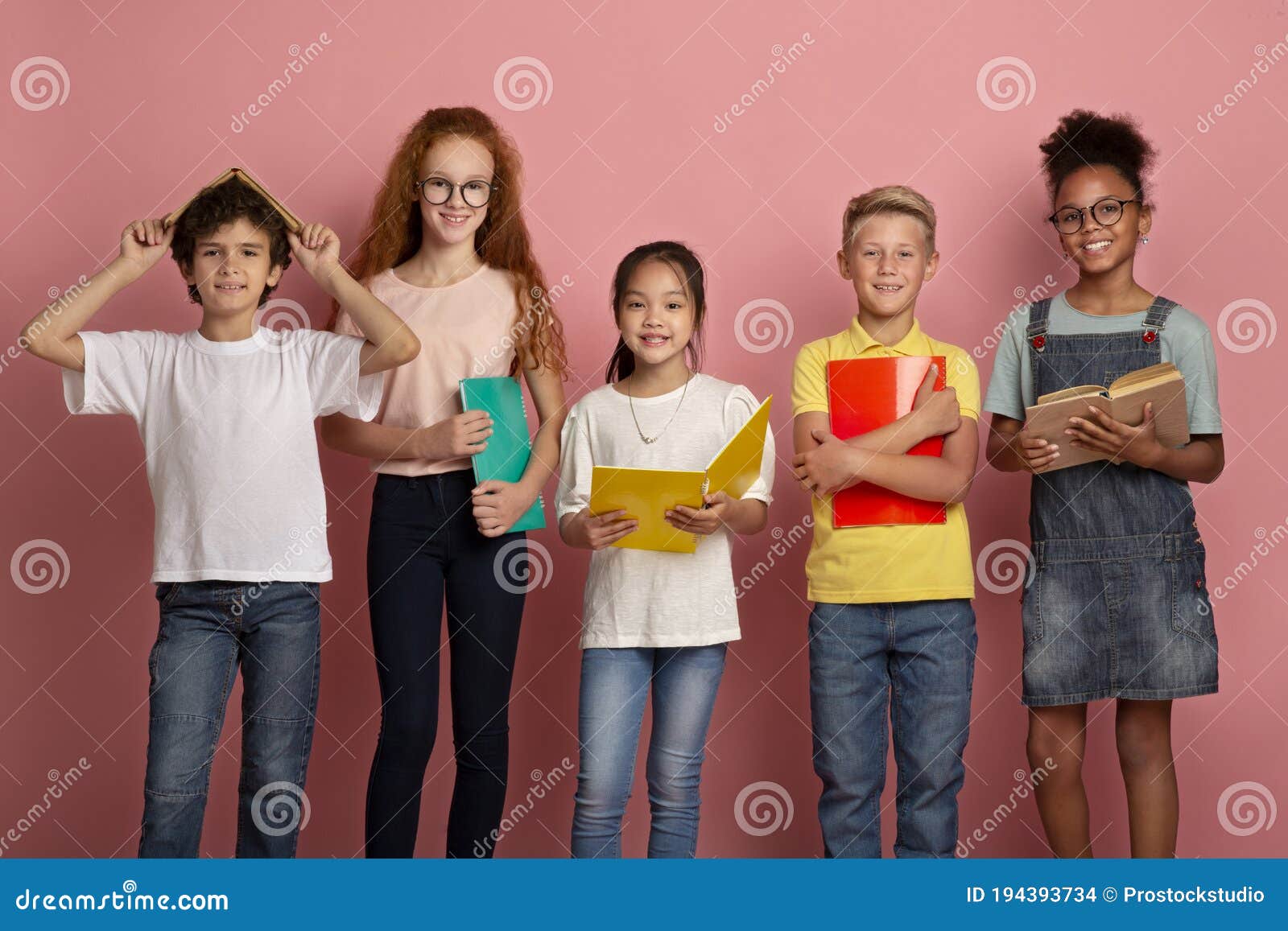 Multinational Group of Kids with Books and Notebooks Ready for School ...