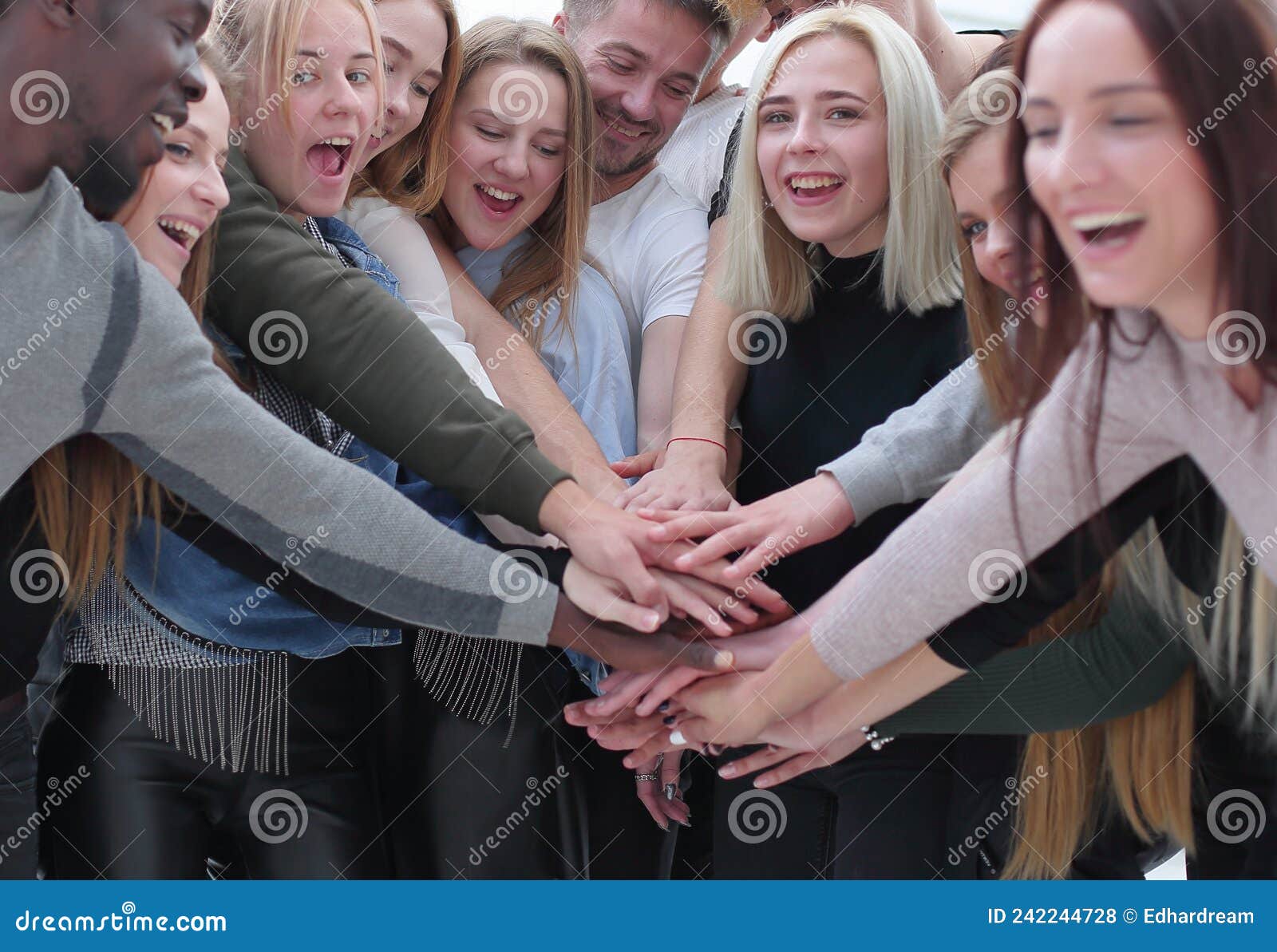 Multinational Group of Students Putting Their Hands Together Stock ...