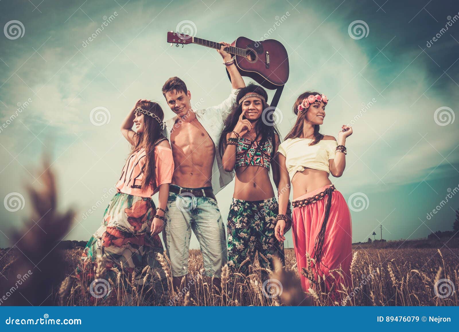 Multinational Hippie Friends with Guitar in a Wheat Field Stock Image ...