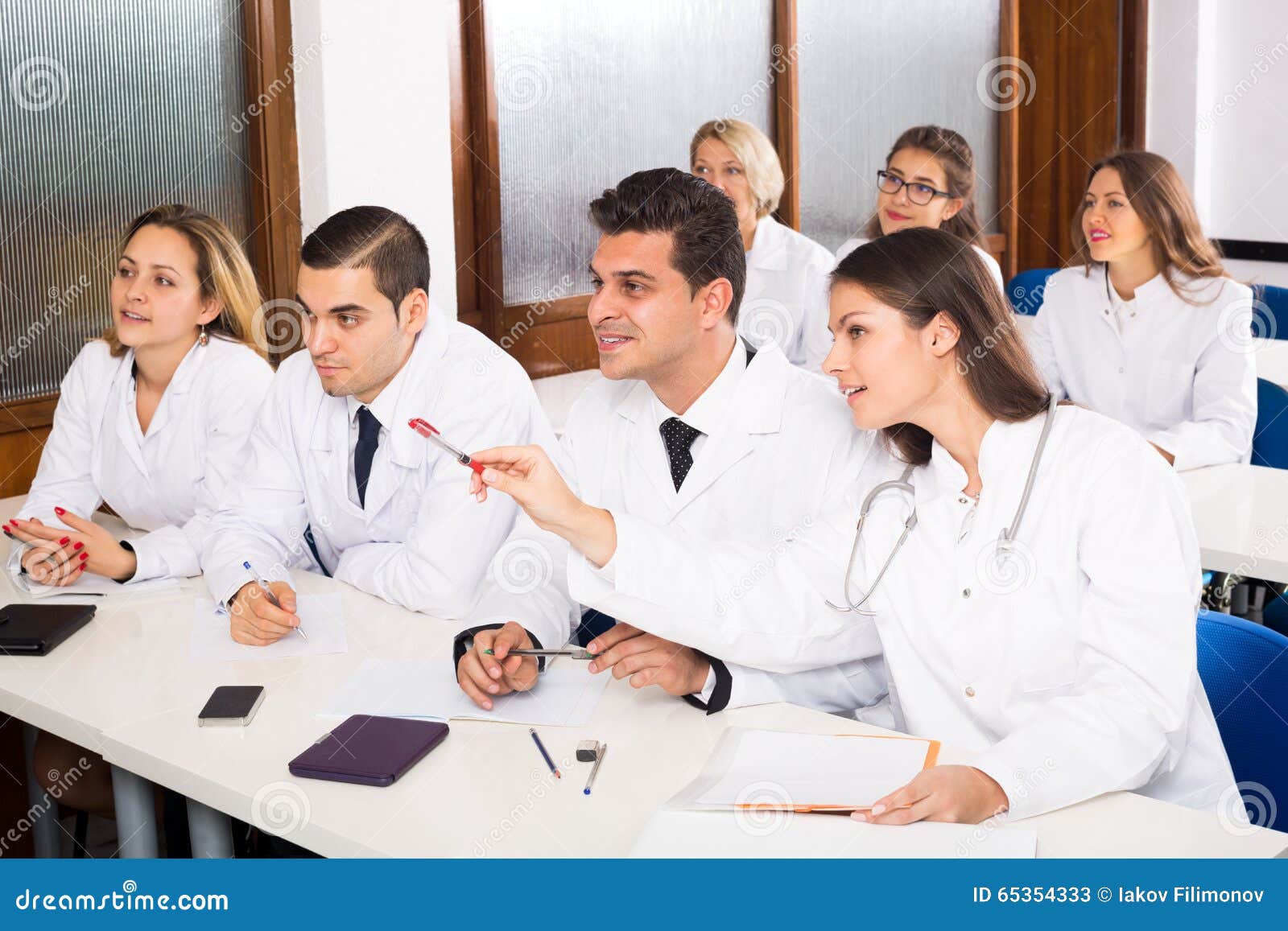 Professor Having Discussion With College Students Stock Photography ...