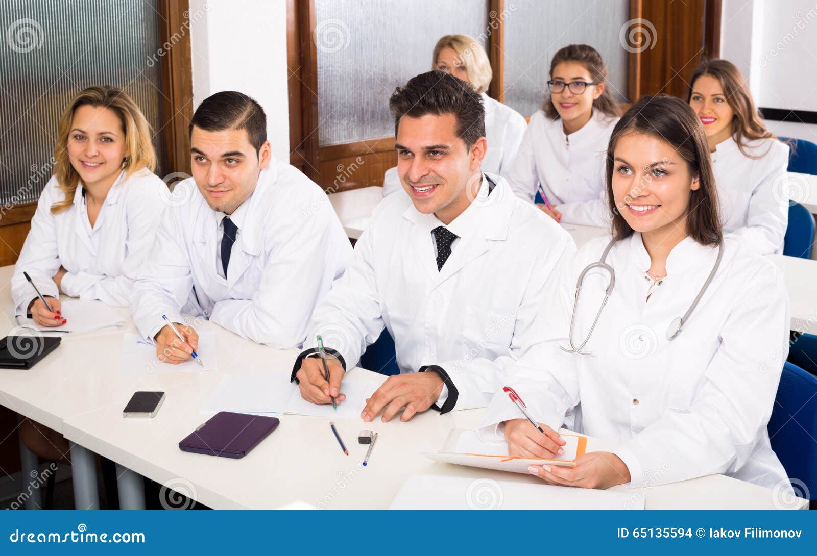 Professor Having Discussion With College Students Stock Photography ...