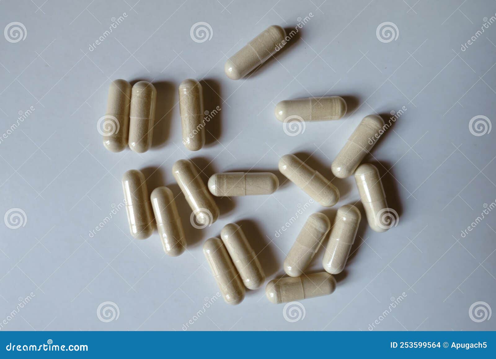 Multiple Beige Capsules of Saccharomyces Boulardii Probiotic from Above ...