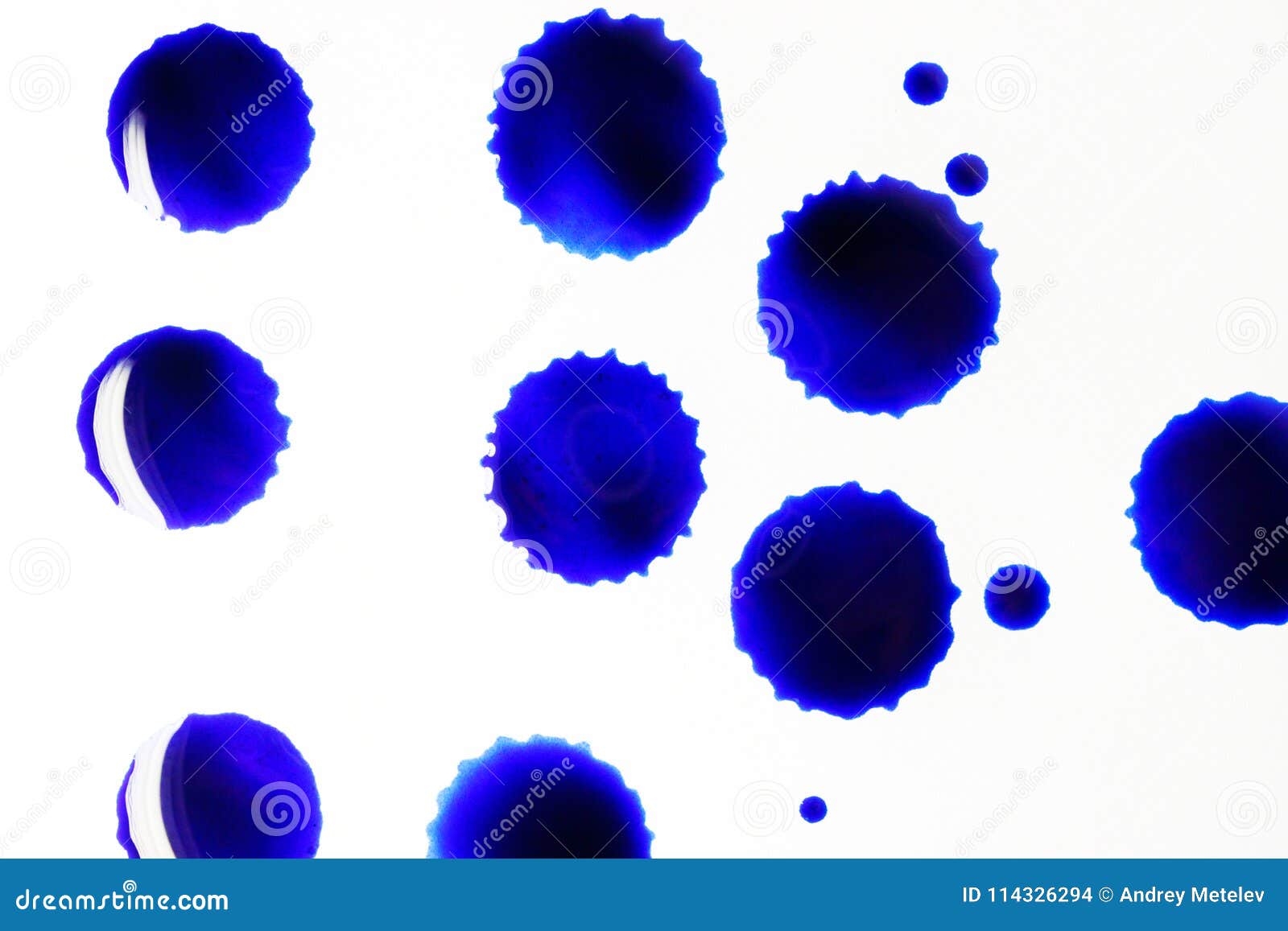 Multiple Blue Spots on White Background, Spots of Translucent Liquid ...