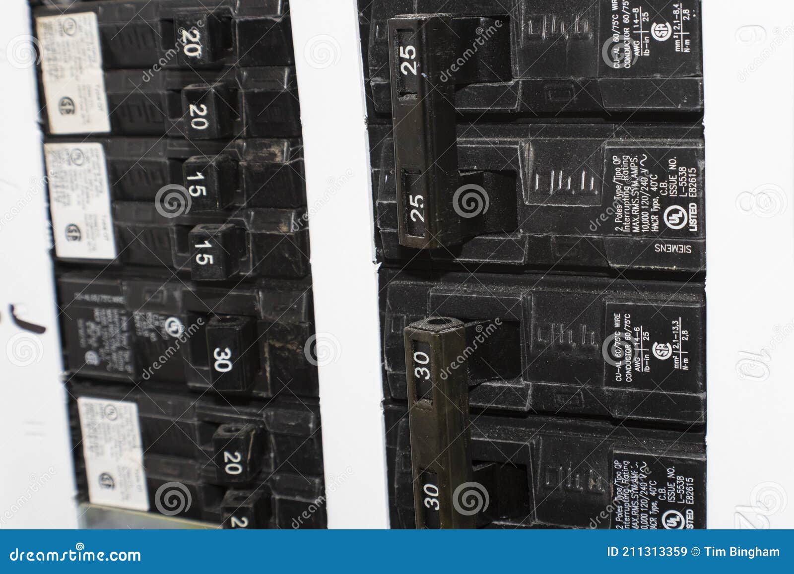Breakers in breaker box stock image. Image of electrical - 211313359