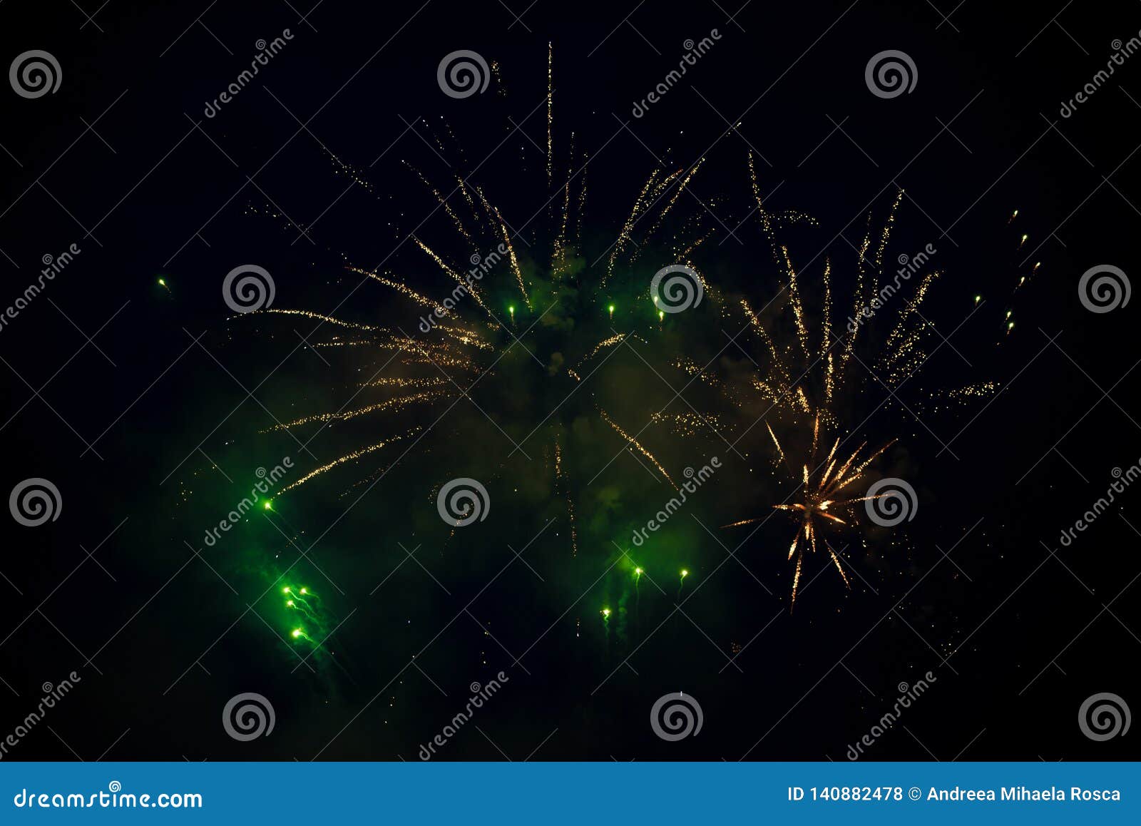 Multiple Bright Orange and Green Colorful Fireworks Explosion in the ...