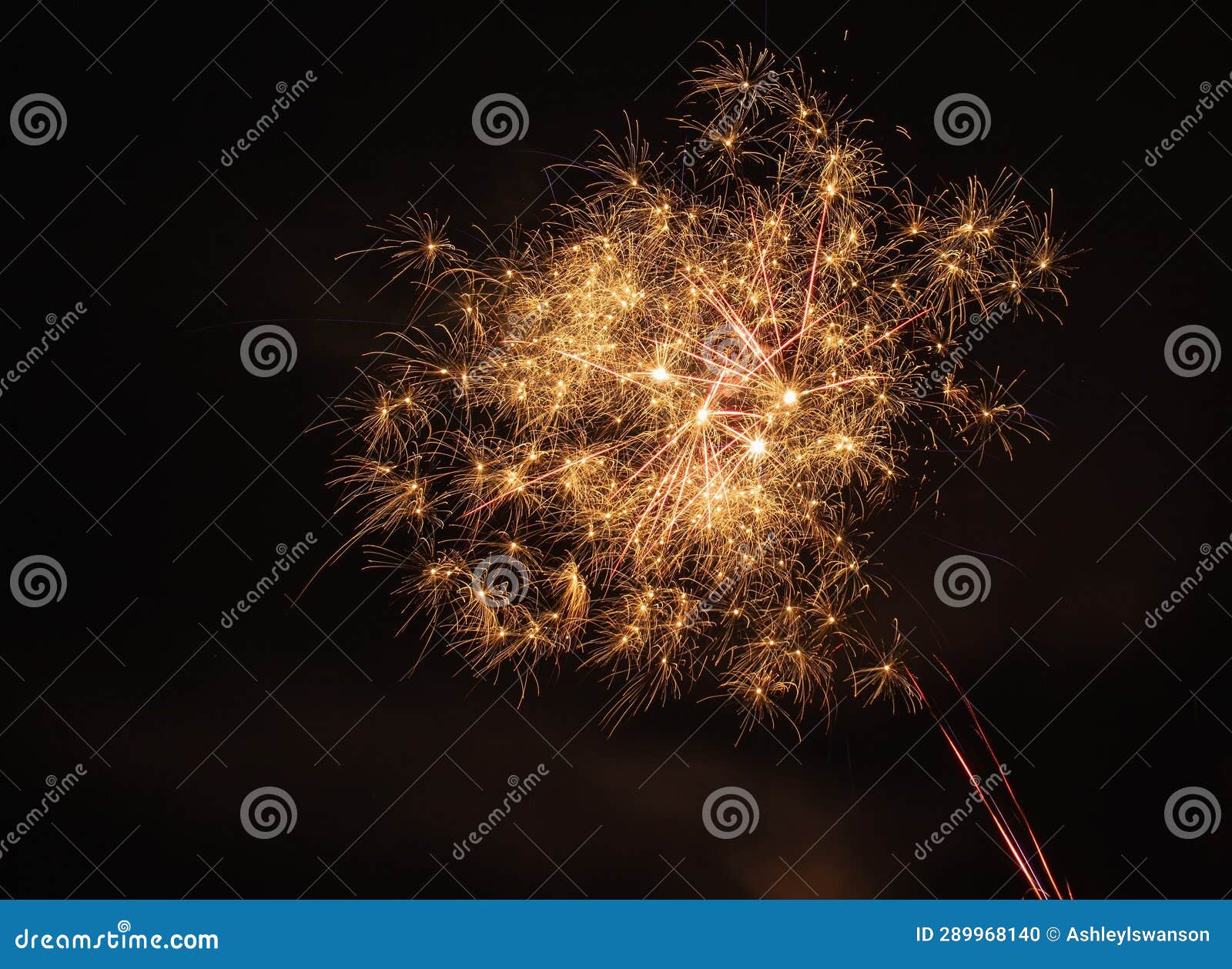 Multiple Bright Yellow Blue and Red Fireworks at Night Stock Photo ...