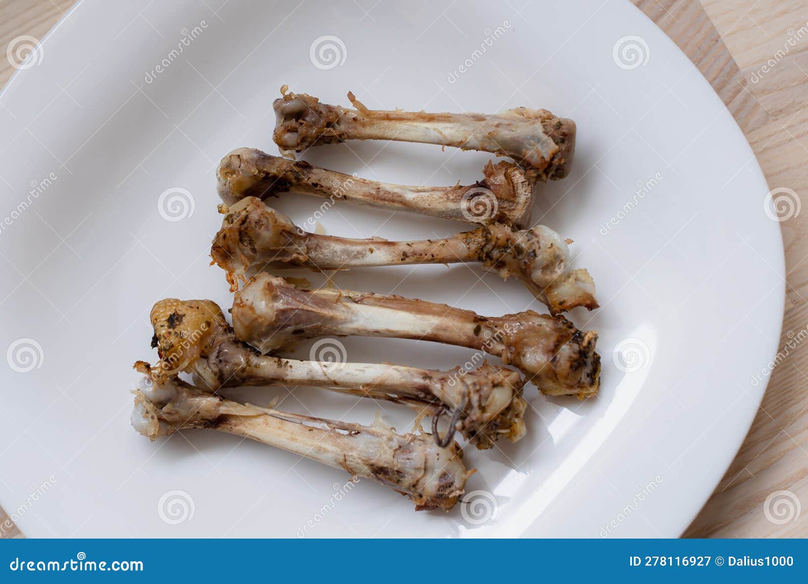 Multiple Chicken Bones on a White Plate Stock Image - Image of prepare ...