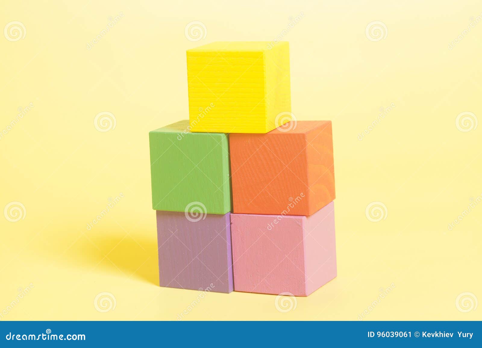 Multiple Colored Cubes on Yellow Stock Image - Image of toys, colored ...