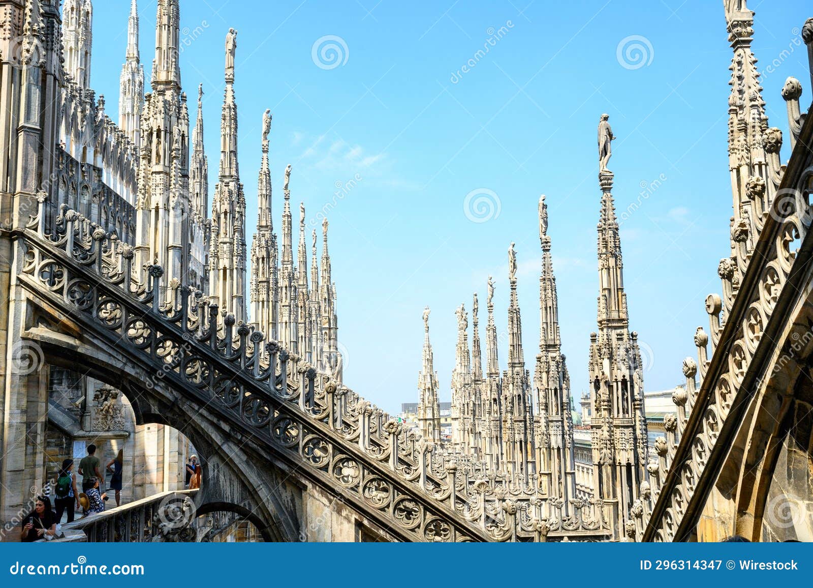 Multiple Columns View on the Top of the Milan Cathedral with a Blue Sky ...