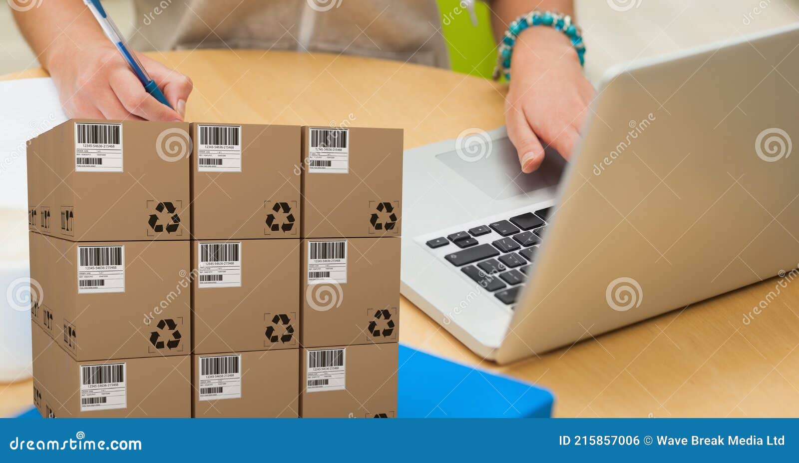 Multiple Delivery Packages with Woman Working in the Background Stock ...