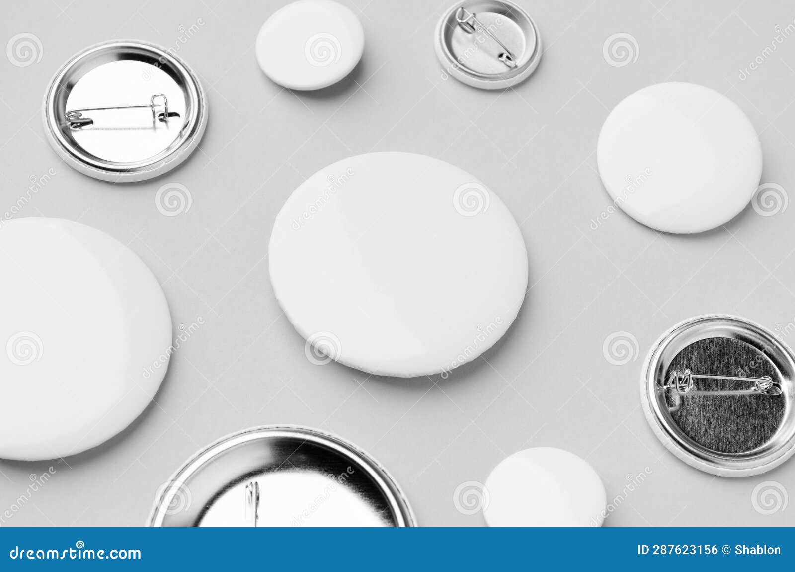 Multiple Different Sized Badges on a Grey Background Stock Photo ...