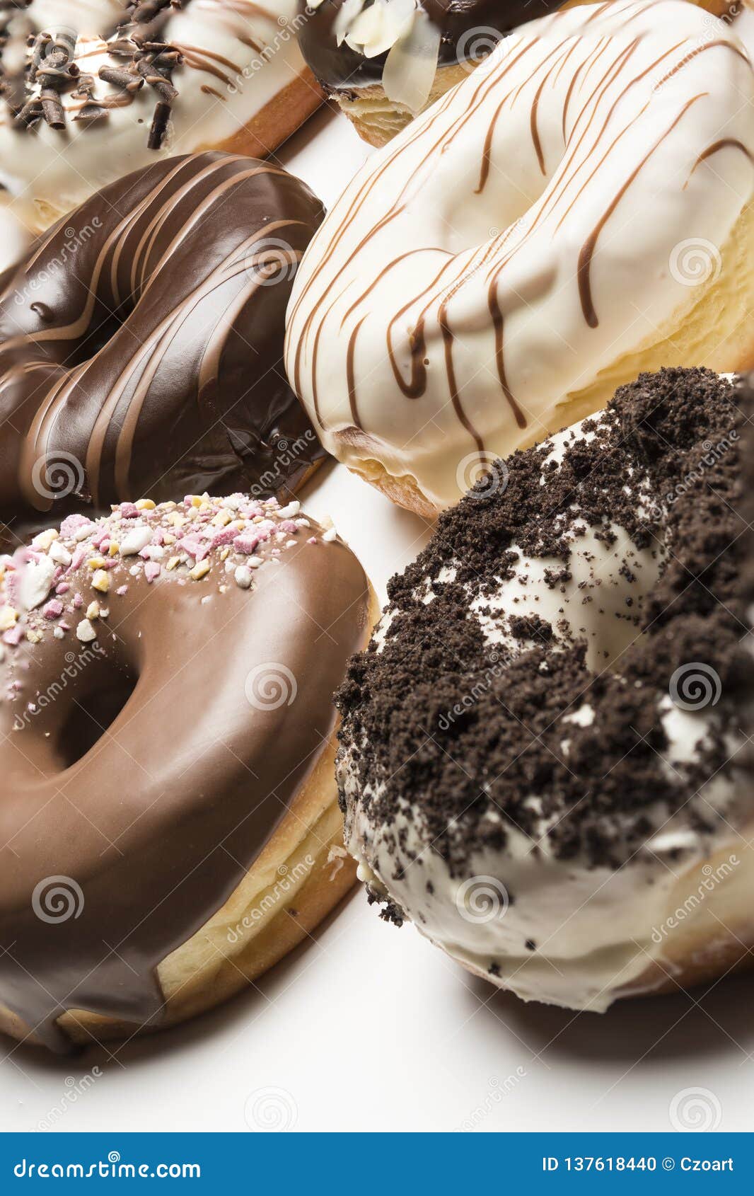 Multiple Doughnuts on White Background. Stock Photo - Image of frosted ...