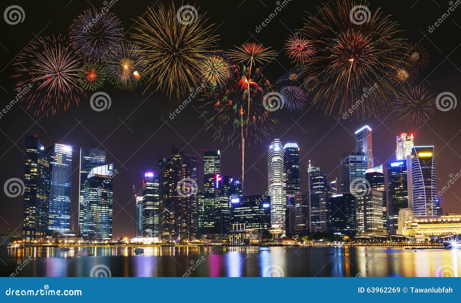 Multiple Fireworks Exploding High in the Sky Over Modern Building in ...