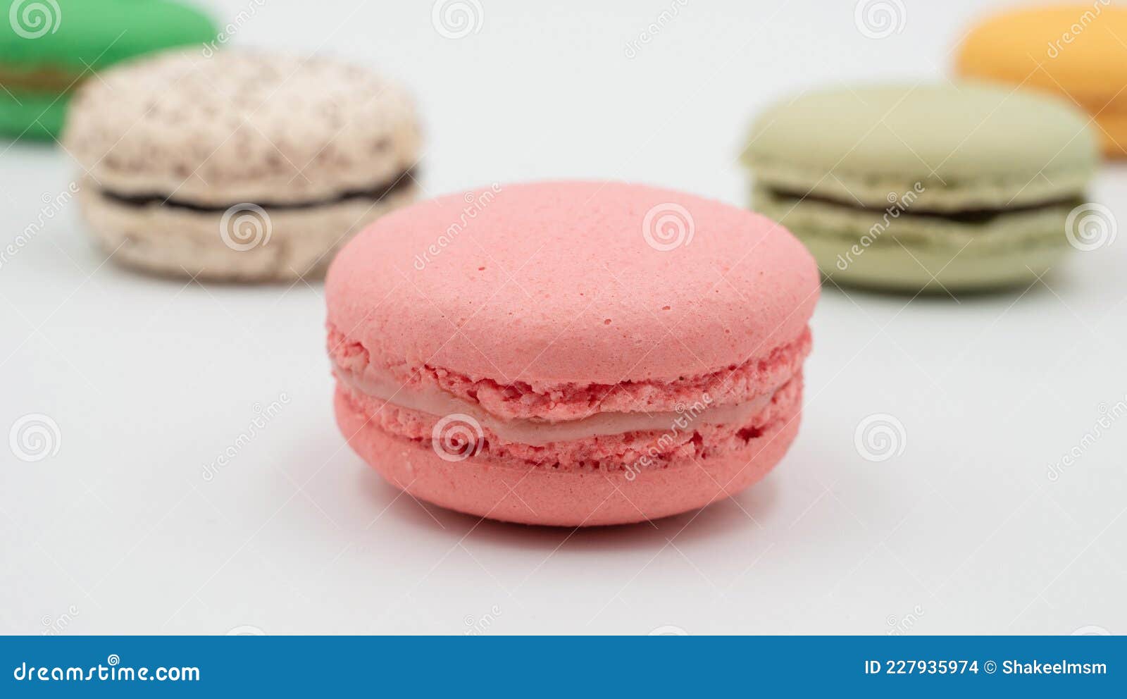 Multiple Flavor Cake Macaron or Macaroon on Turquoise Macros on a White ...