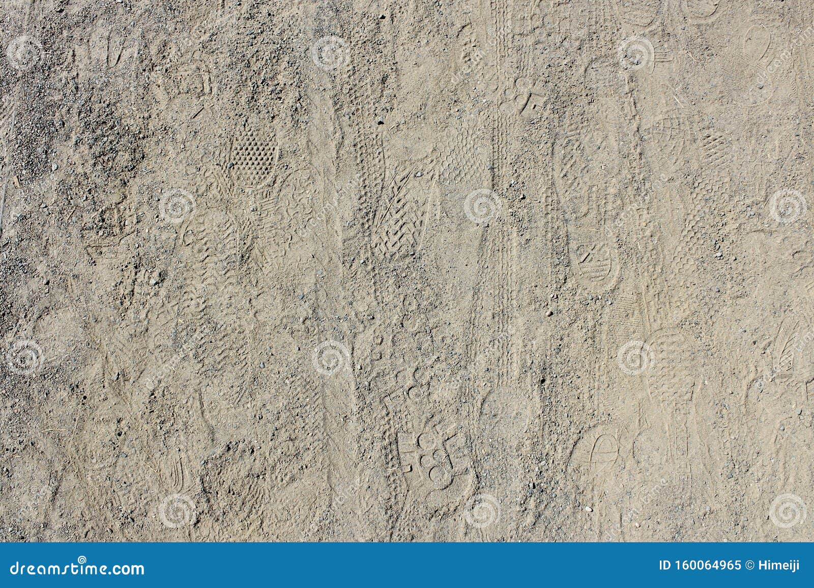 Multiple Footprints In The Sand Desert. Footprints Are Of Shoes, Boots ...