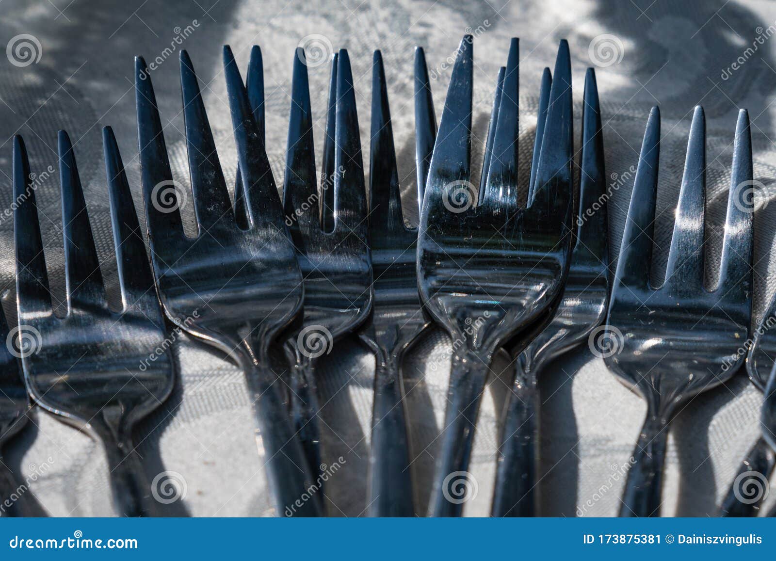 Multiple Forks on a Gray Tablecloth Stock Image - Image of object ...