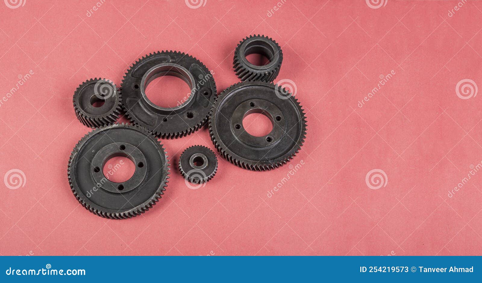 Multiple Gears Joined Together on Isolated Red Banner Stock Image ...