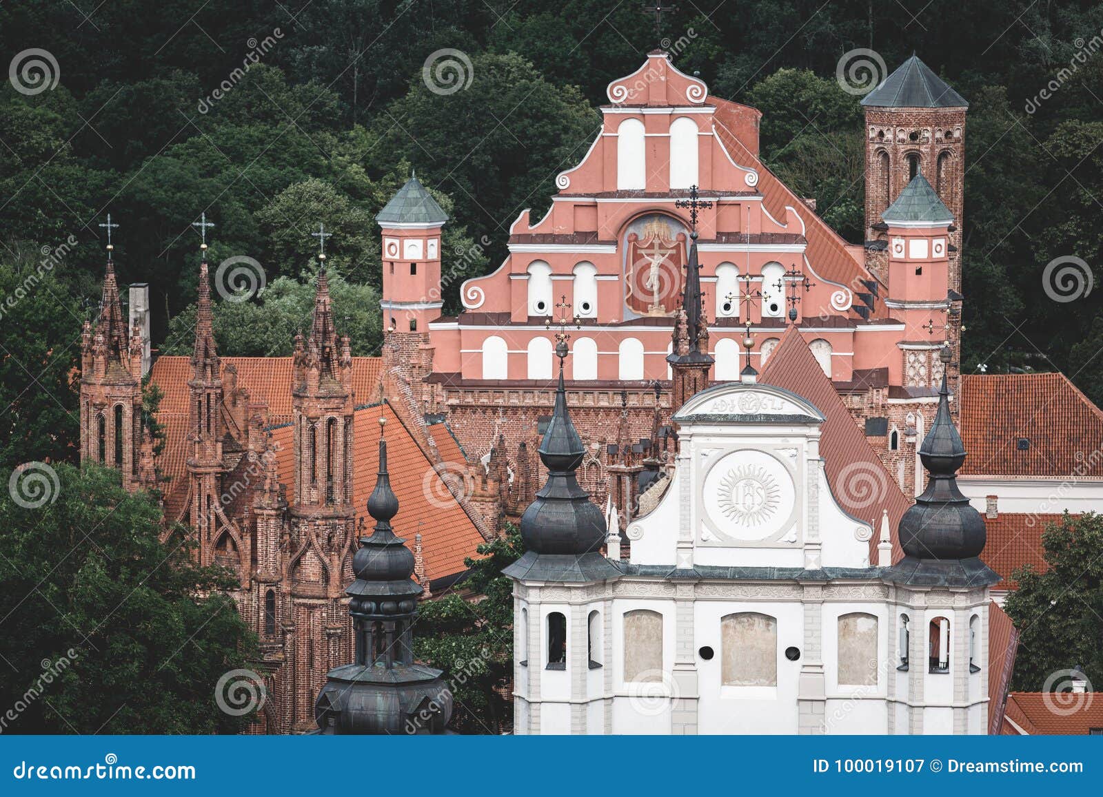 Multiple Historic Churches Surrounded by Green Trees in Vilnius ...