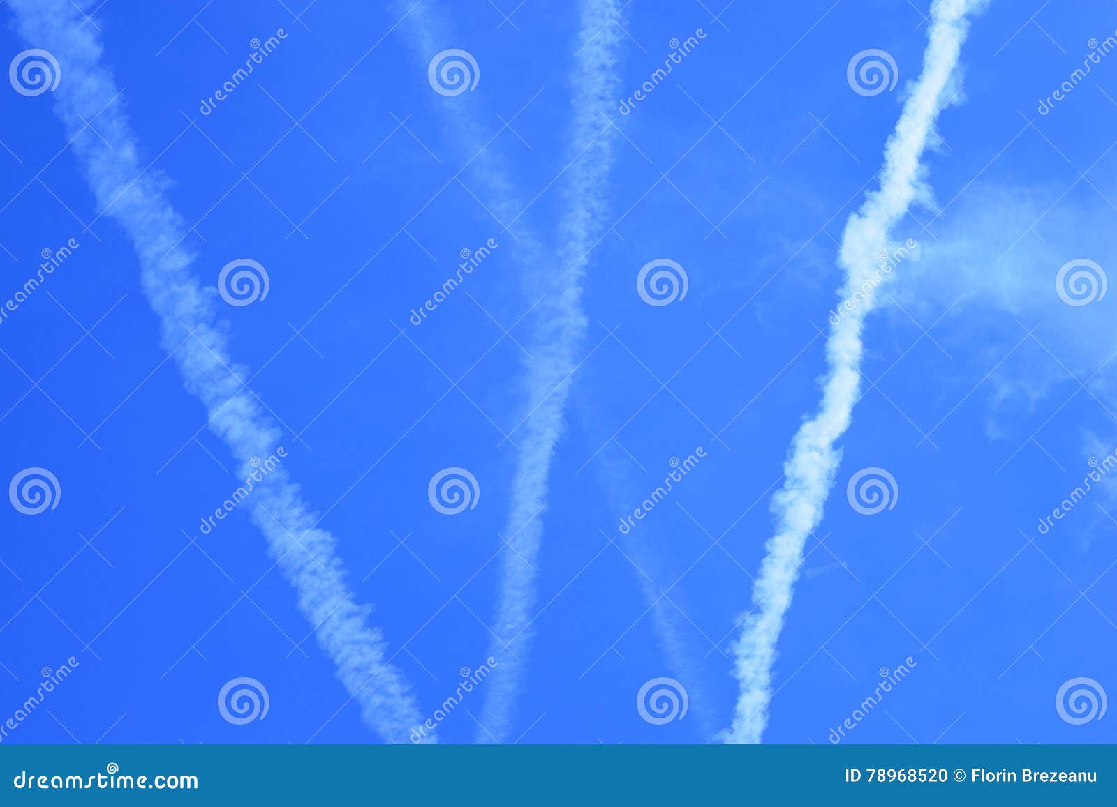 Multiple Jet Streams of Aiplane on Blue Sky Stock Photo - Image of ...