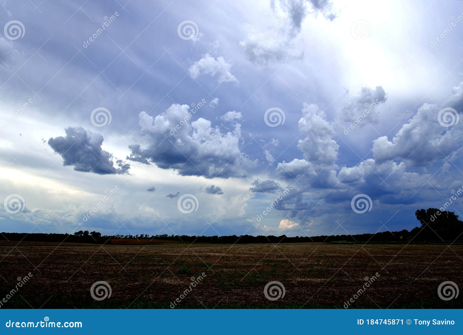 Multiple Layers of Storm Clouds Over Flat Farm Field Stock Image ...