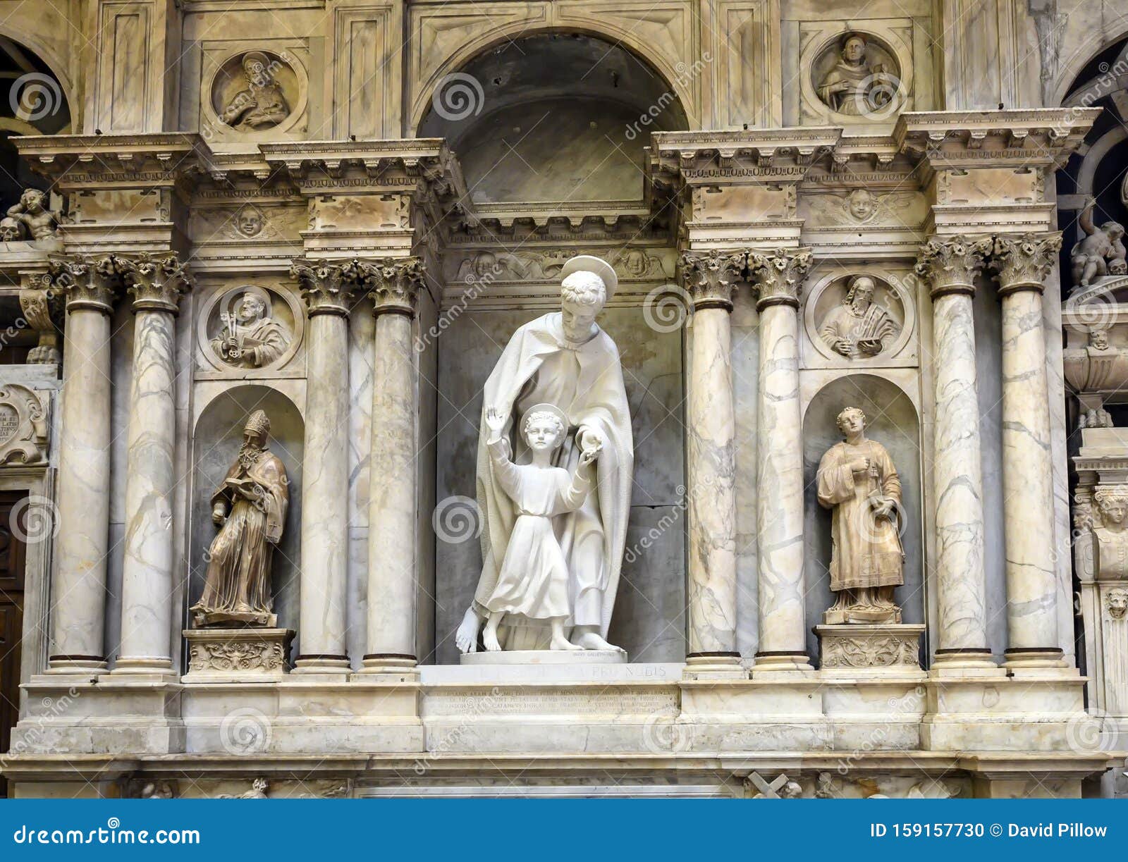 Multiple Marble Statues of Saints on a Wall in the Genoa Cathedral ...