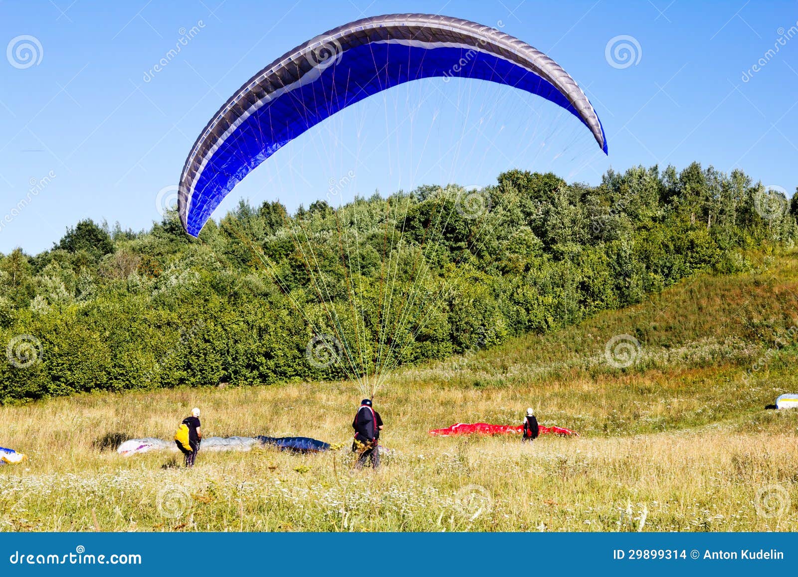 Paragliders are Preparing To Fly Against the Backdrop of the Beautiful ...