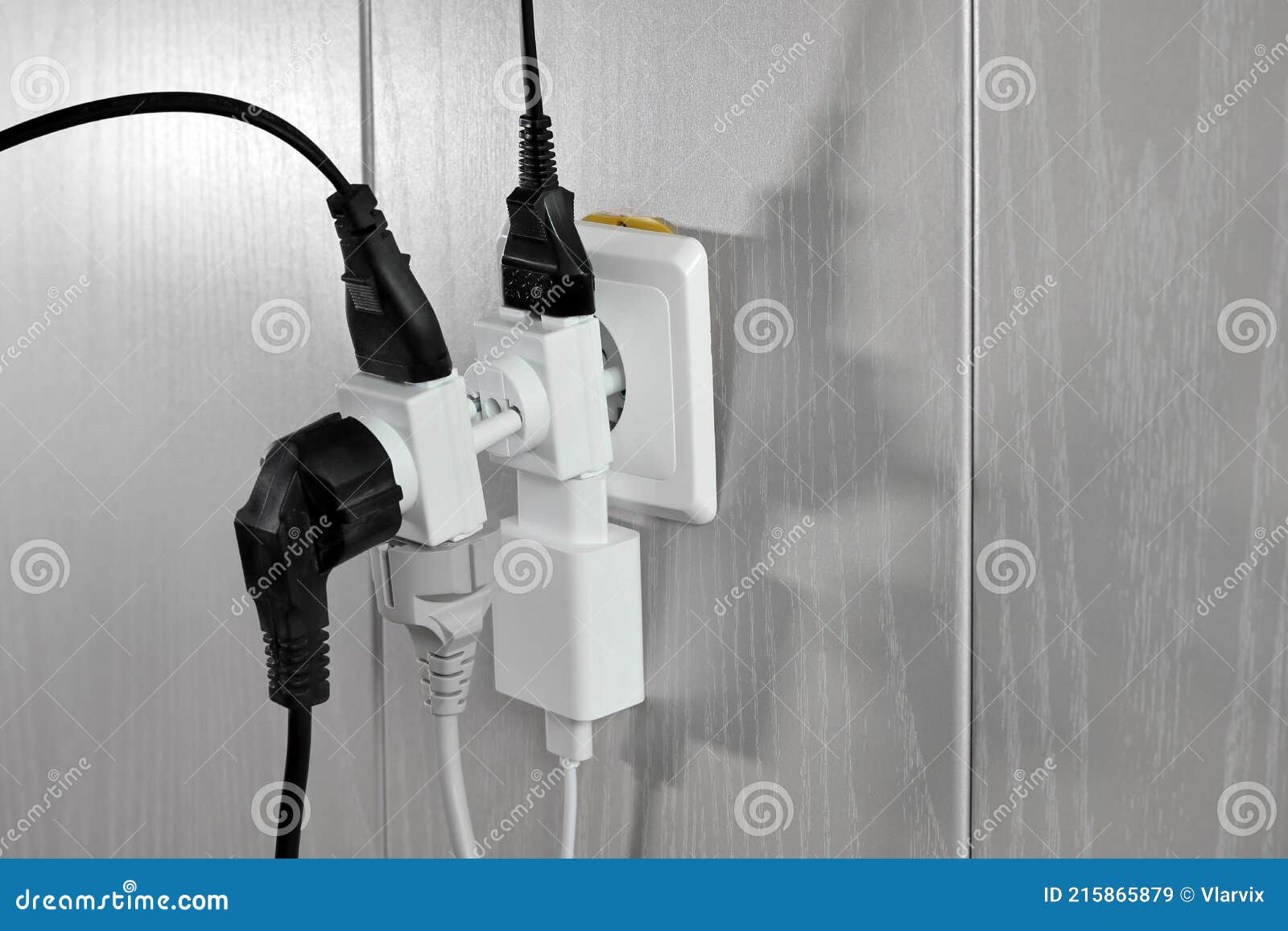 Multiple Plugs in Wall Electrical Outlet is Dangerous Overload, Close ...