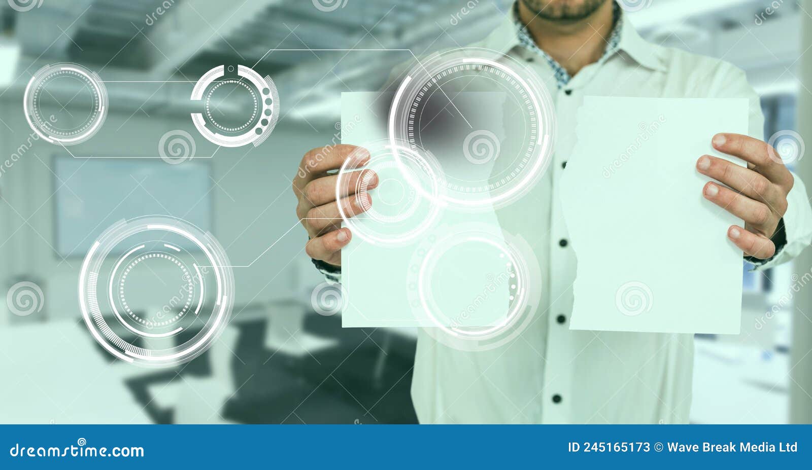 Multiple Round Scanners Against Mid Section of a Man Holding Blank ... Multiple Round Scanners Against Mid Section of a Man Holding Blank ...