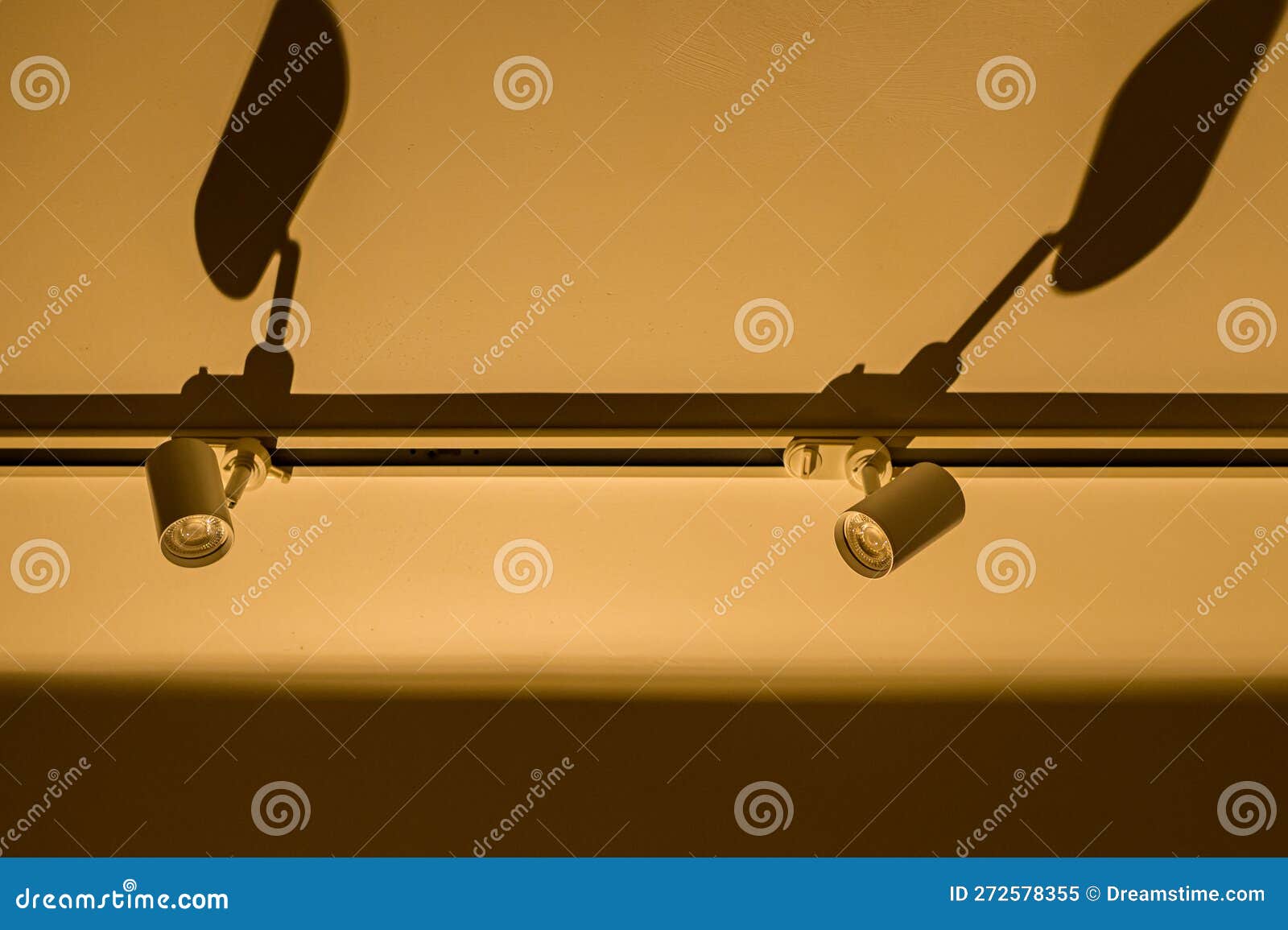 Multiple Spotlights Railing on Ceiling Wall. Stock Image - Image of ...