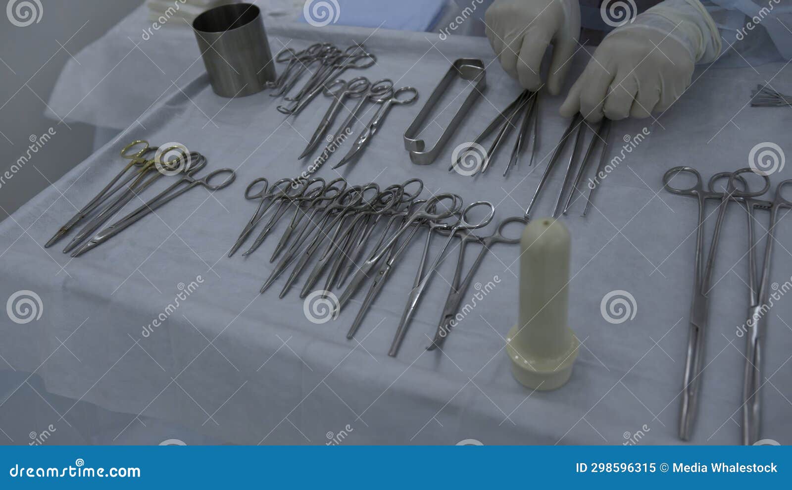 Multiple Surgery Instruments on Blue Table. Action. Surgeon Put Down ...