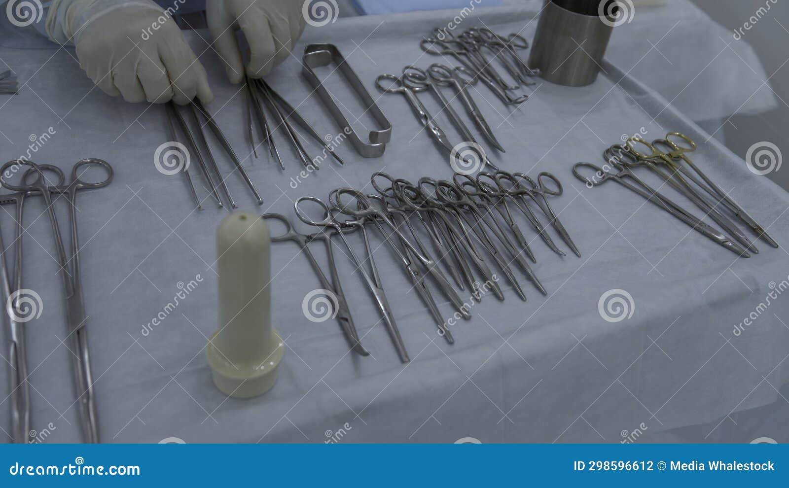 Multiple Surgery Instruments on Blue Table. Action. Surgeon Put Down ...
