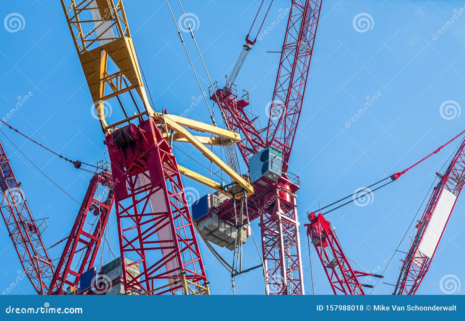Multiple Tower Cranes Above a Concrete Structure Stock Photo - Image of ...